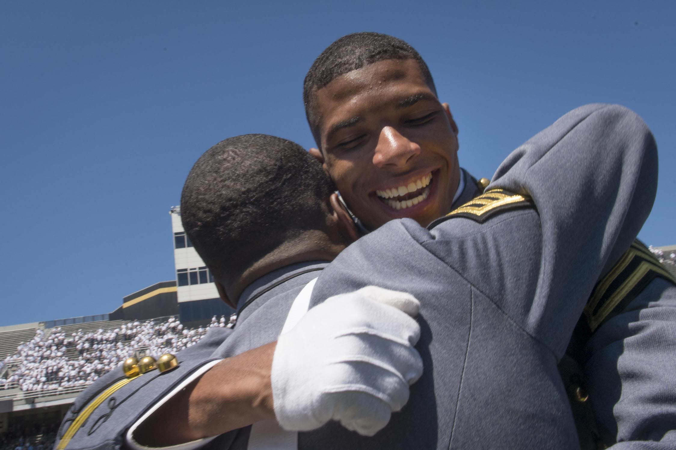 Members of the U.S. Military Academy's Class of 2015 congratulate each ...