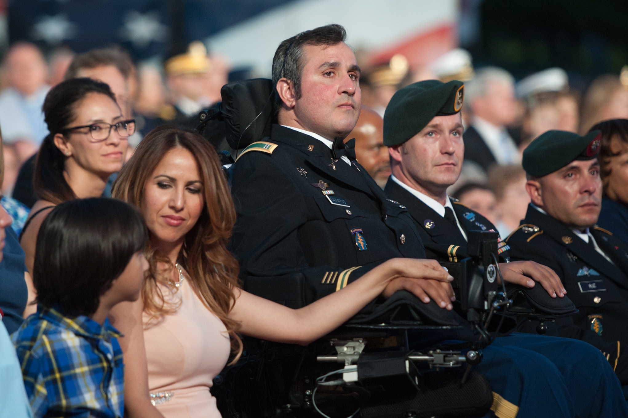 Wounded warrior Romulo Camargo and his family attend the 26th National ...