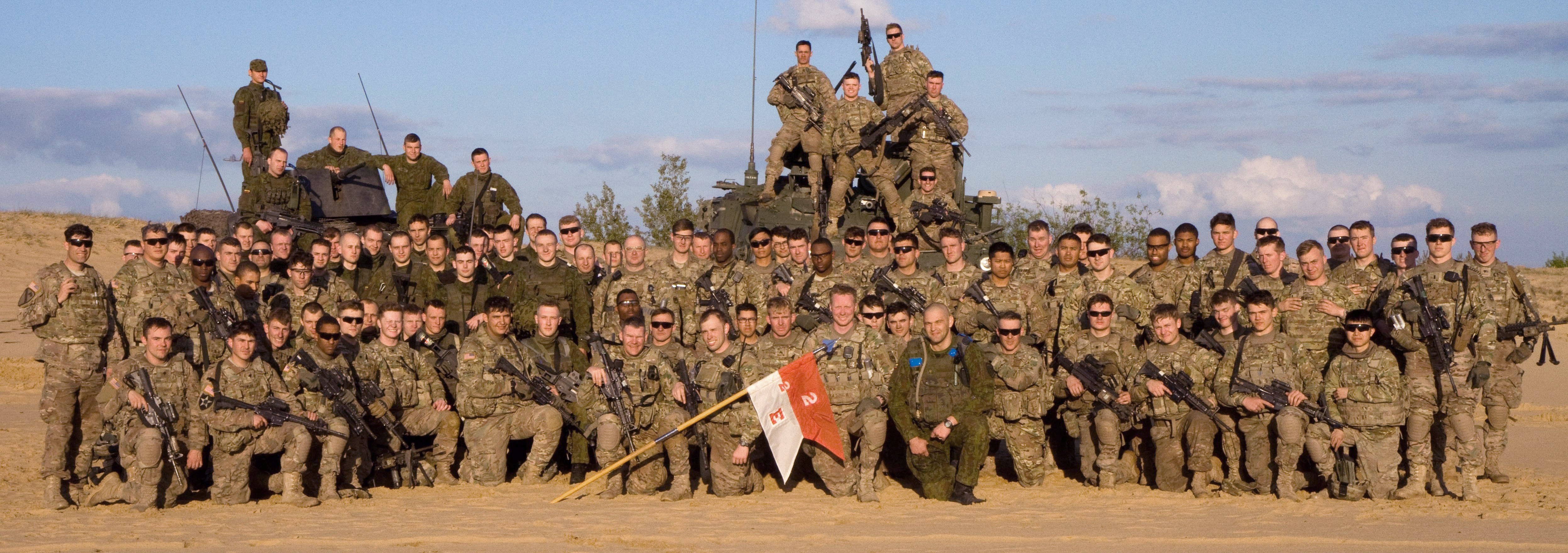 U.S. and Lithuanian soldiers pose for a photograph after a joint live ...