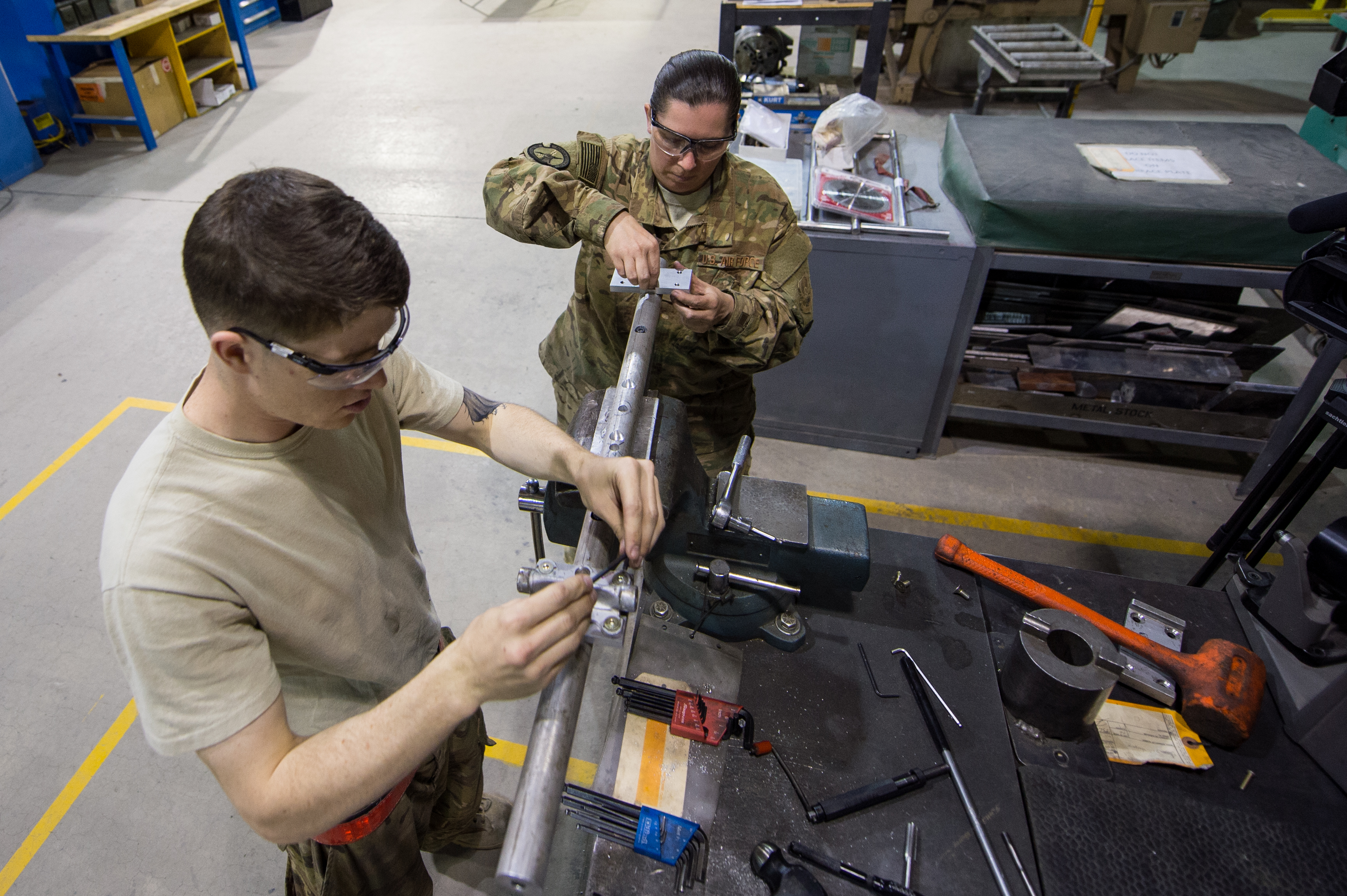 U.S. Air Force Airman 1st Class Daniel Gregory, left, and Staff Sgt ...