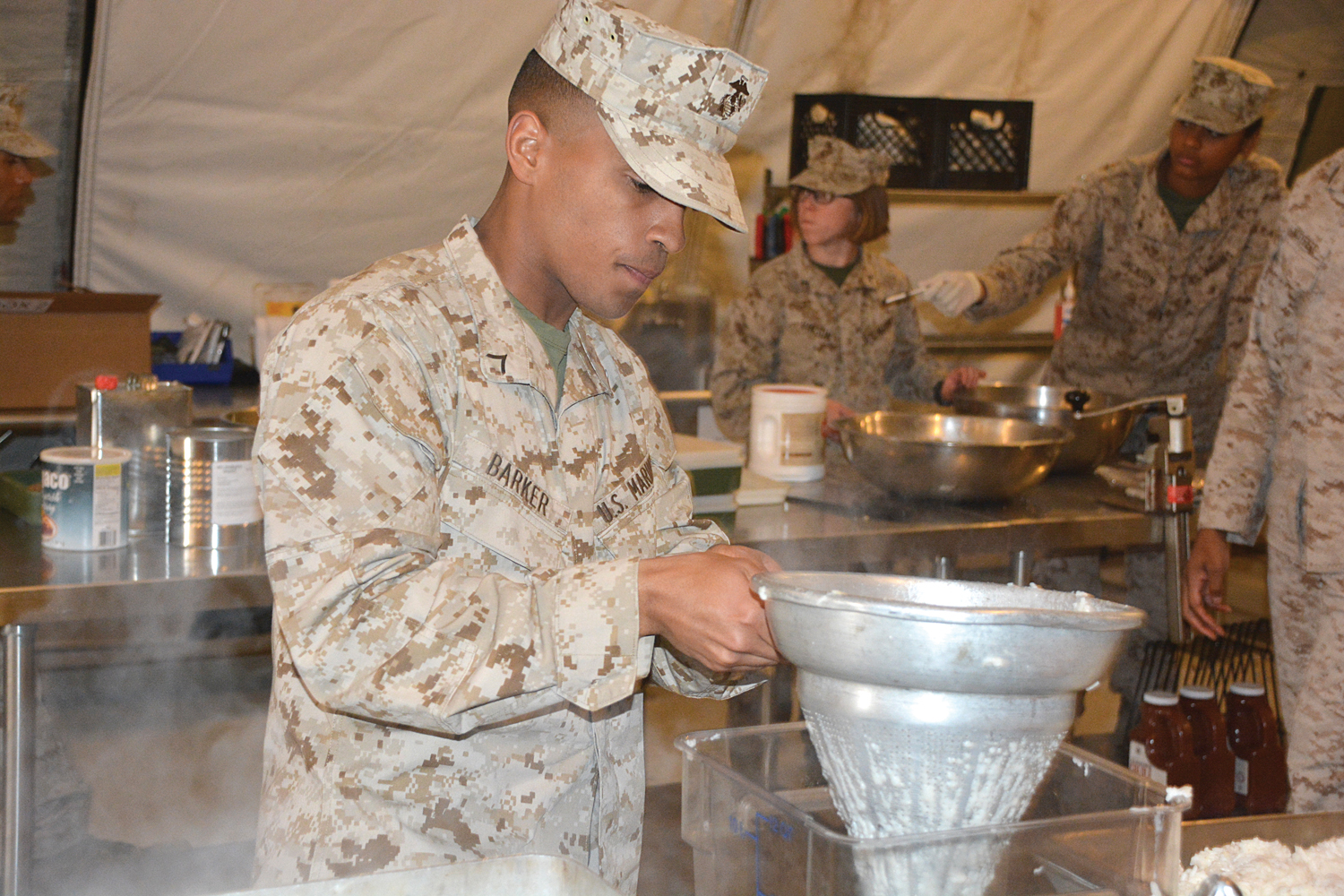 Marine students prepare final meal in ‘joint-field environment'