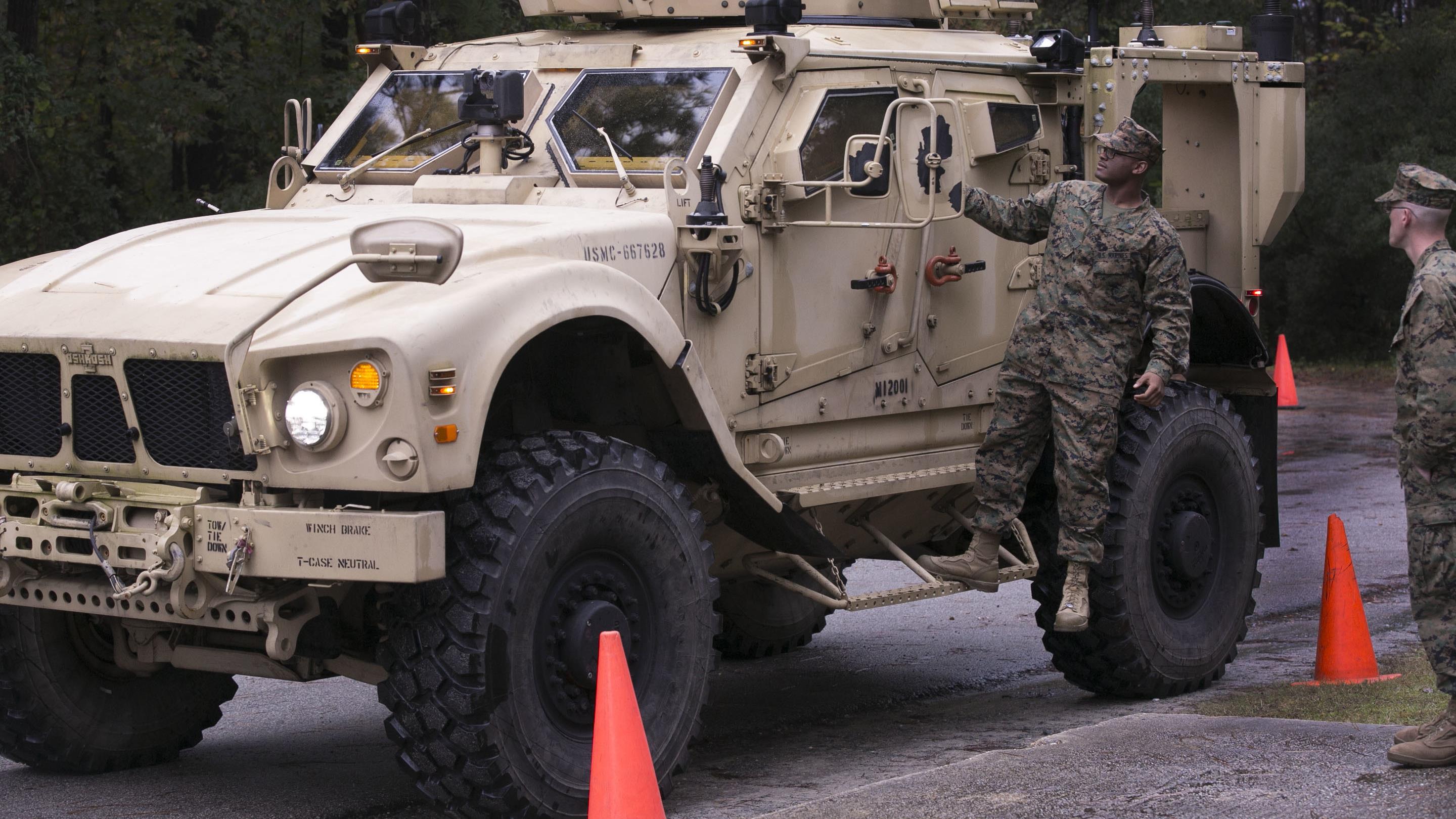 Marines drive through heavy snowfall and harsh winds to obtain tactical ...