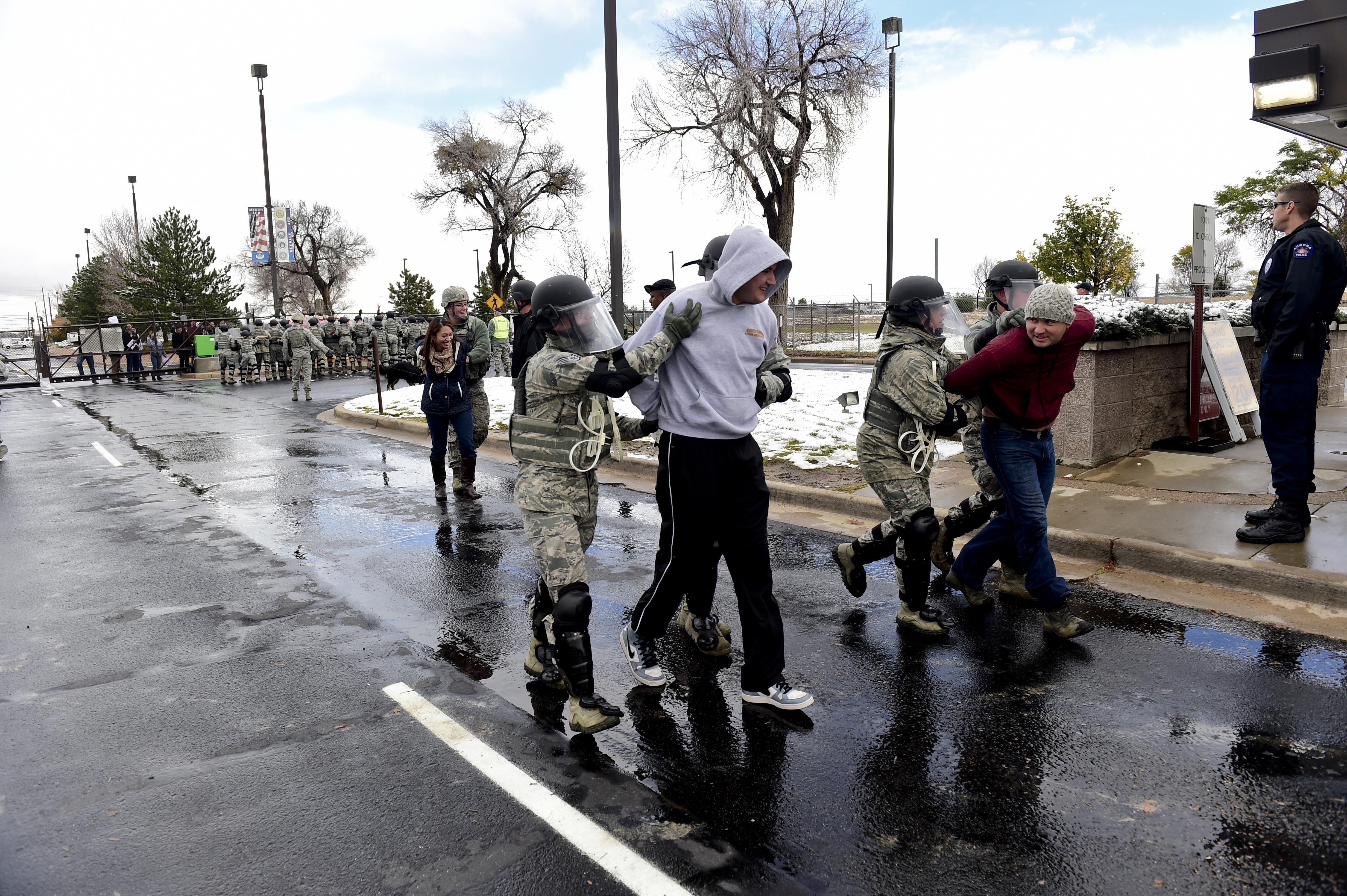 Buckley's defenders participate in mock protest during exercise ...