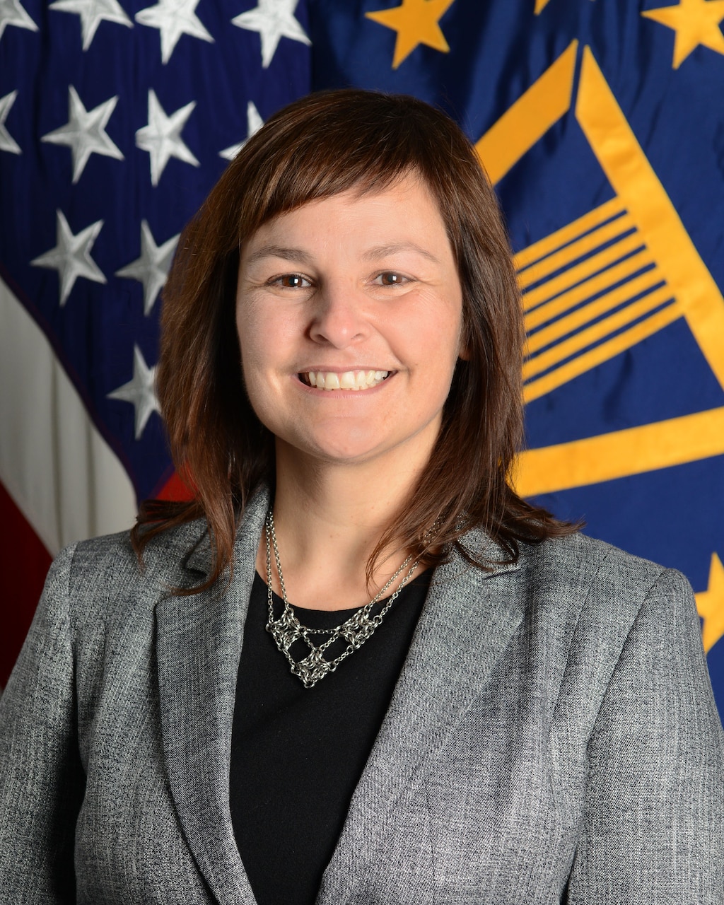 Dr. Melissa L. Flagg > U.S. Department of War > Biography