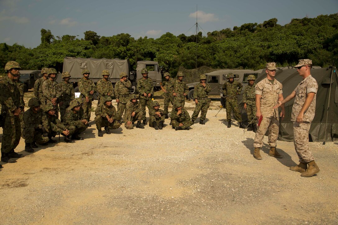 Building bonds, sharing knowledge: JGSDF learns PMO's law enforcement ...