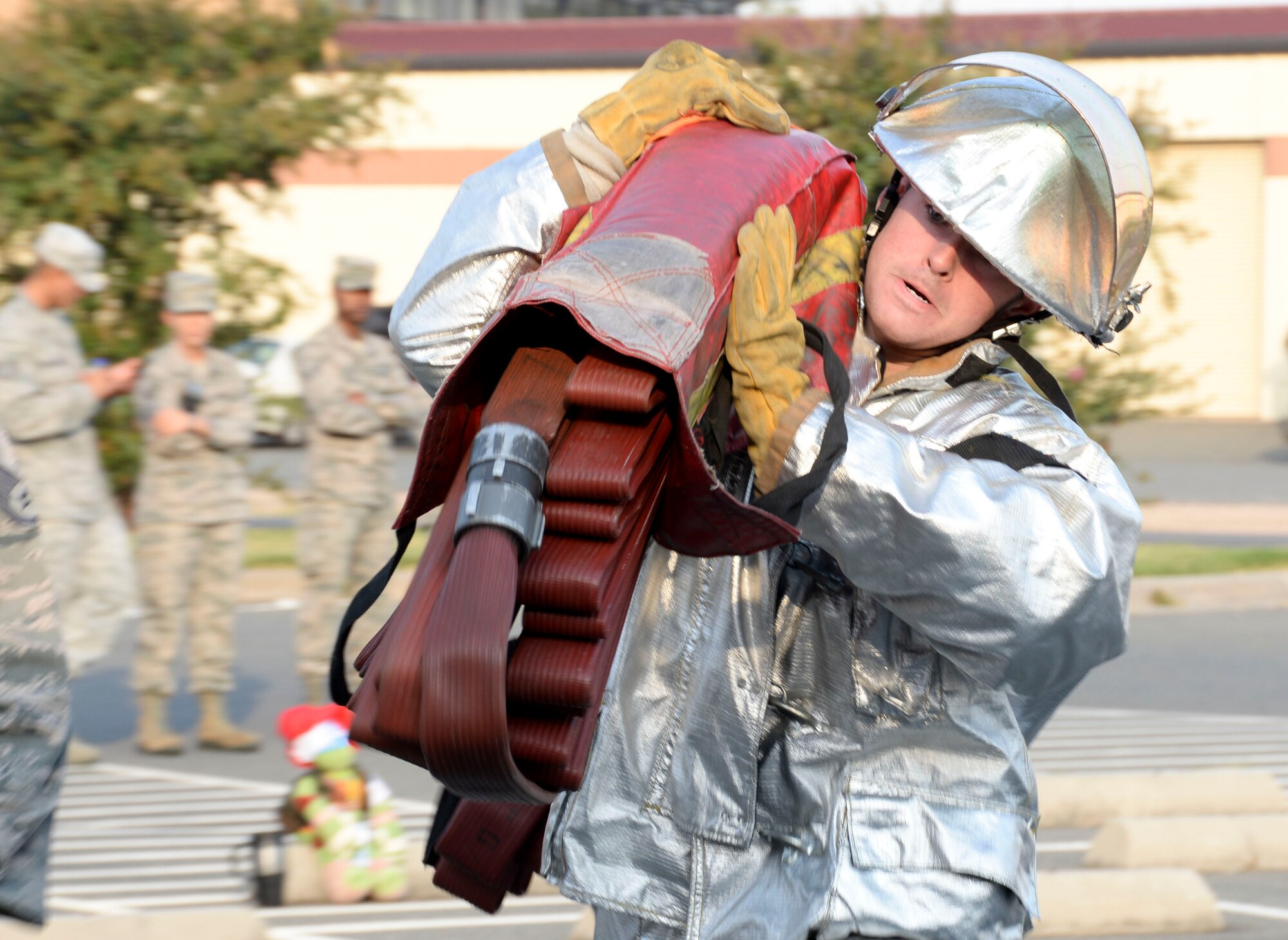 Competition burns red hot: Airmen do their best firefighter ...