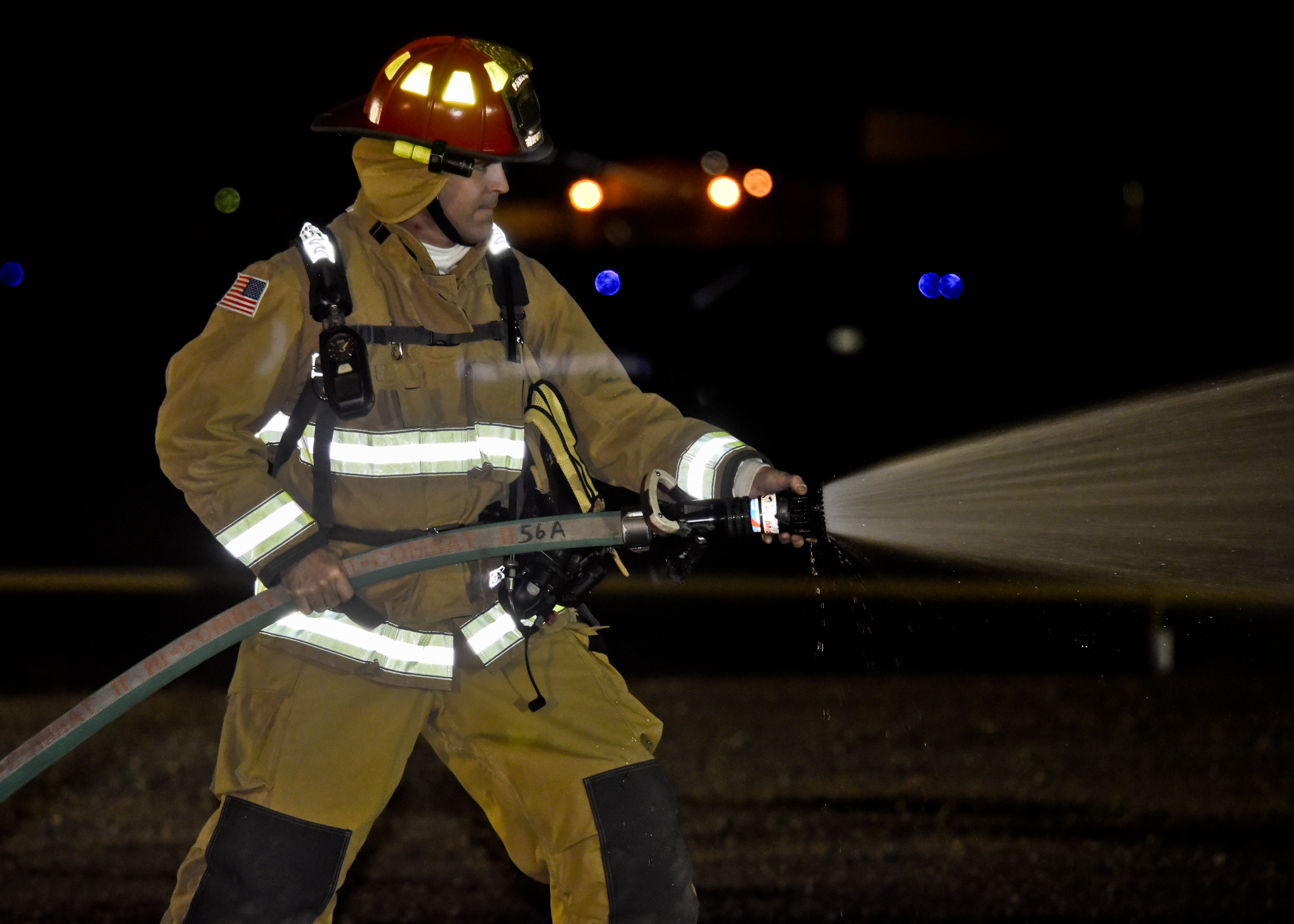 Base leadership learns what it takes to be a firefighter > Fairchild ...
