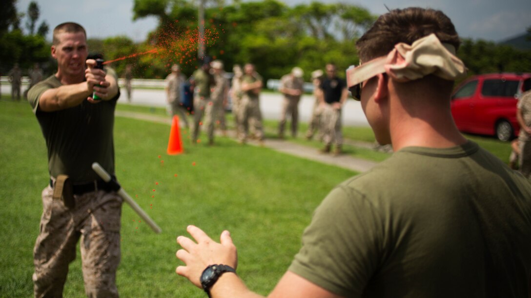 Service Members Get OC’ed to Become Non-Lethal Weapons Instructors