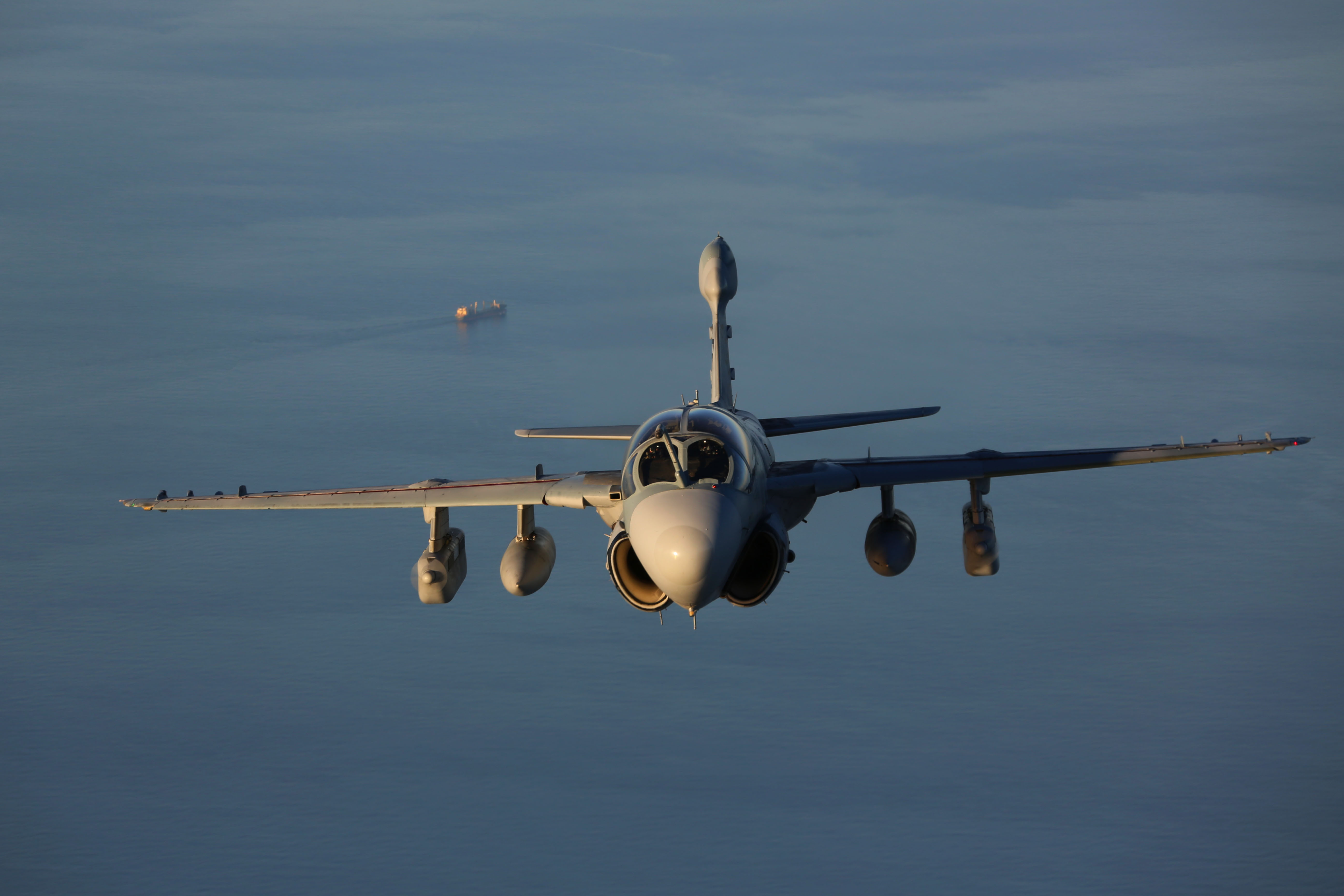 Cherry Point aircraft glide through setting skies