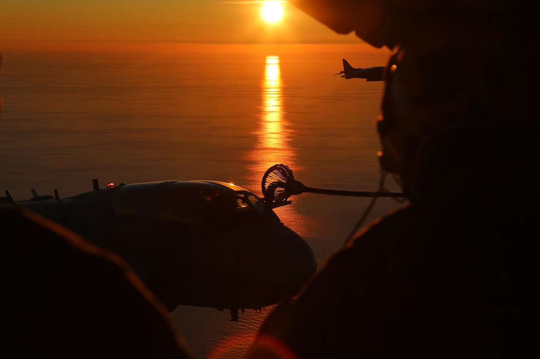 Cherry Point aircraft glide through setting skies