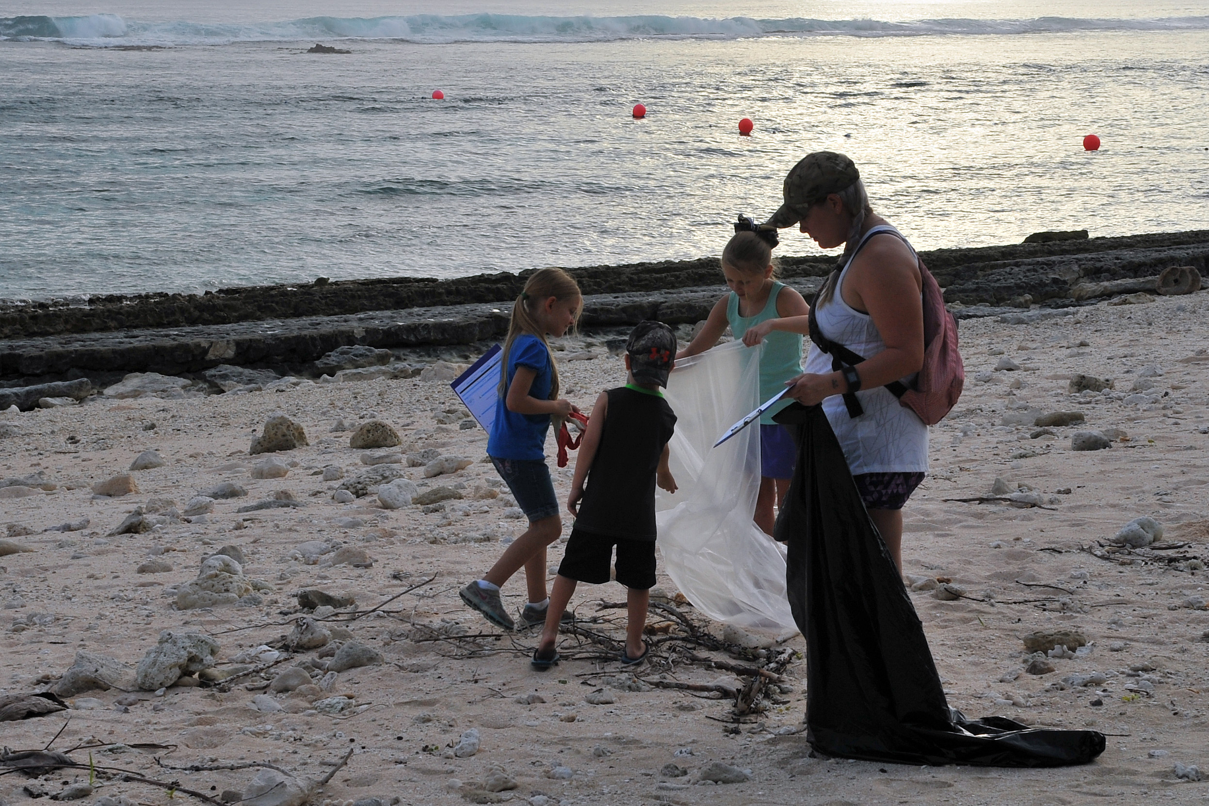 Volunteers gather at Tarague Beach for Guam's 21st International ...