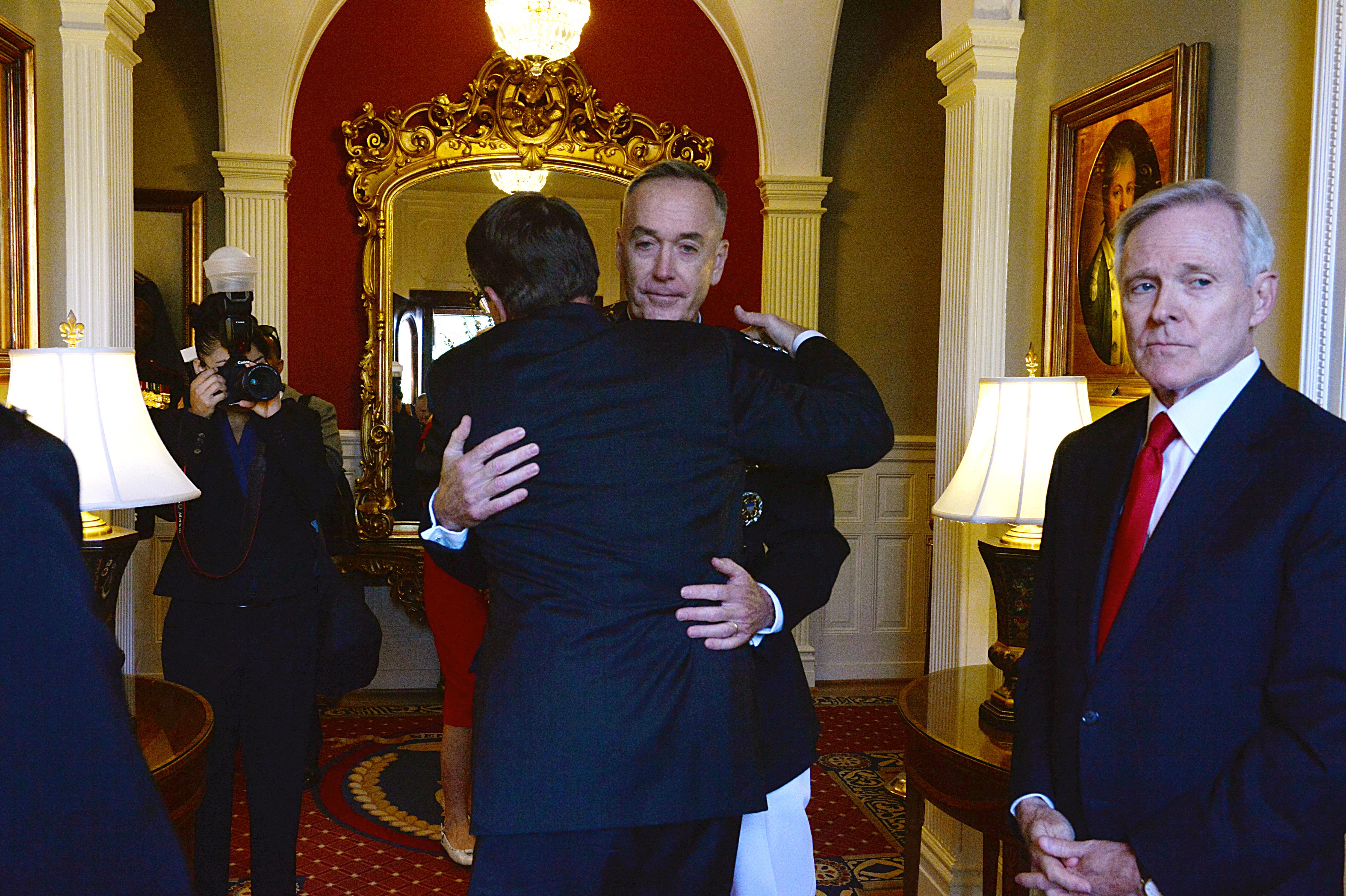 Carter Embraces Dunford | U.S. Department of War