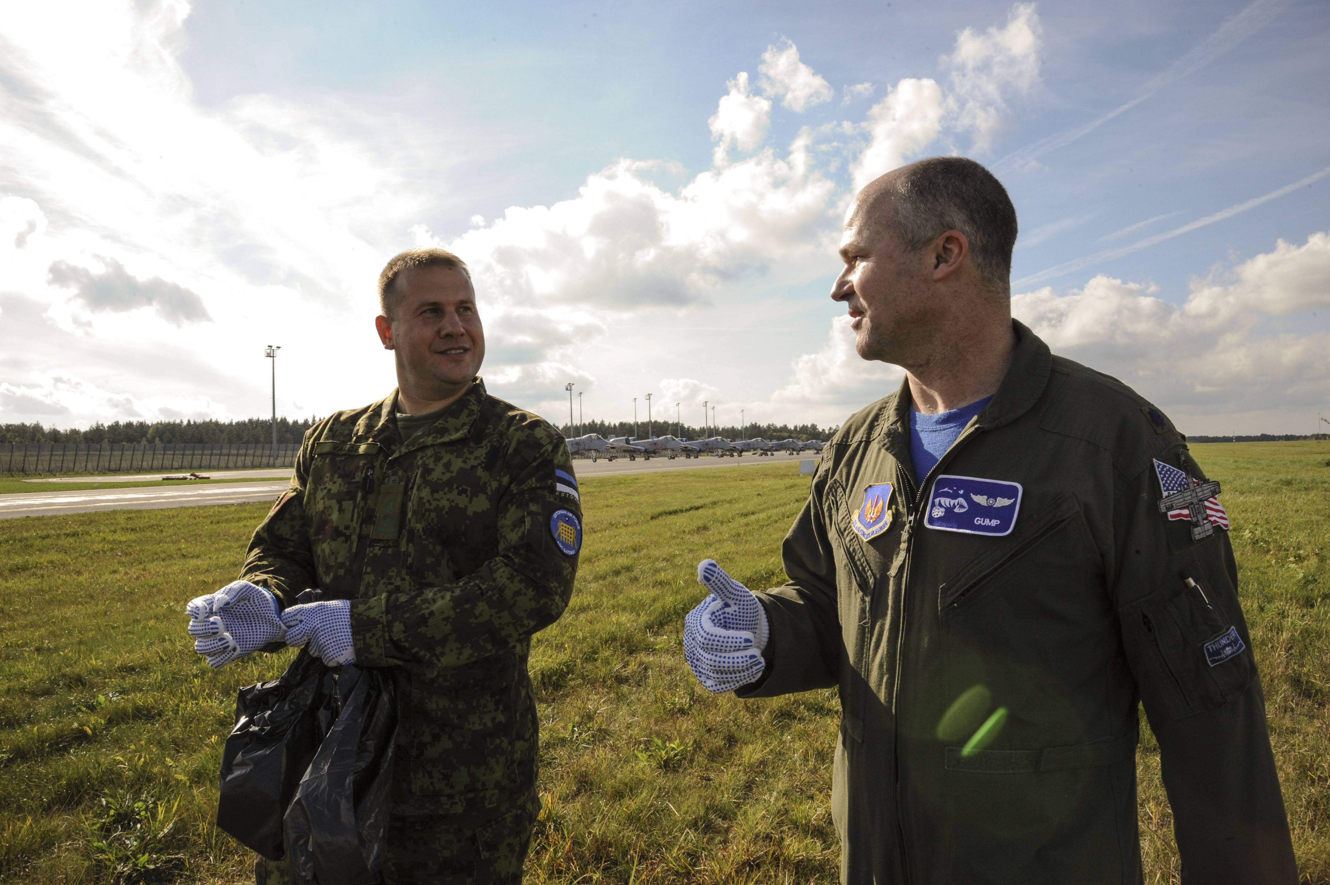 U.S., Estonian Airmen gather, clean flight line > U.S. Air Forces in ...