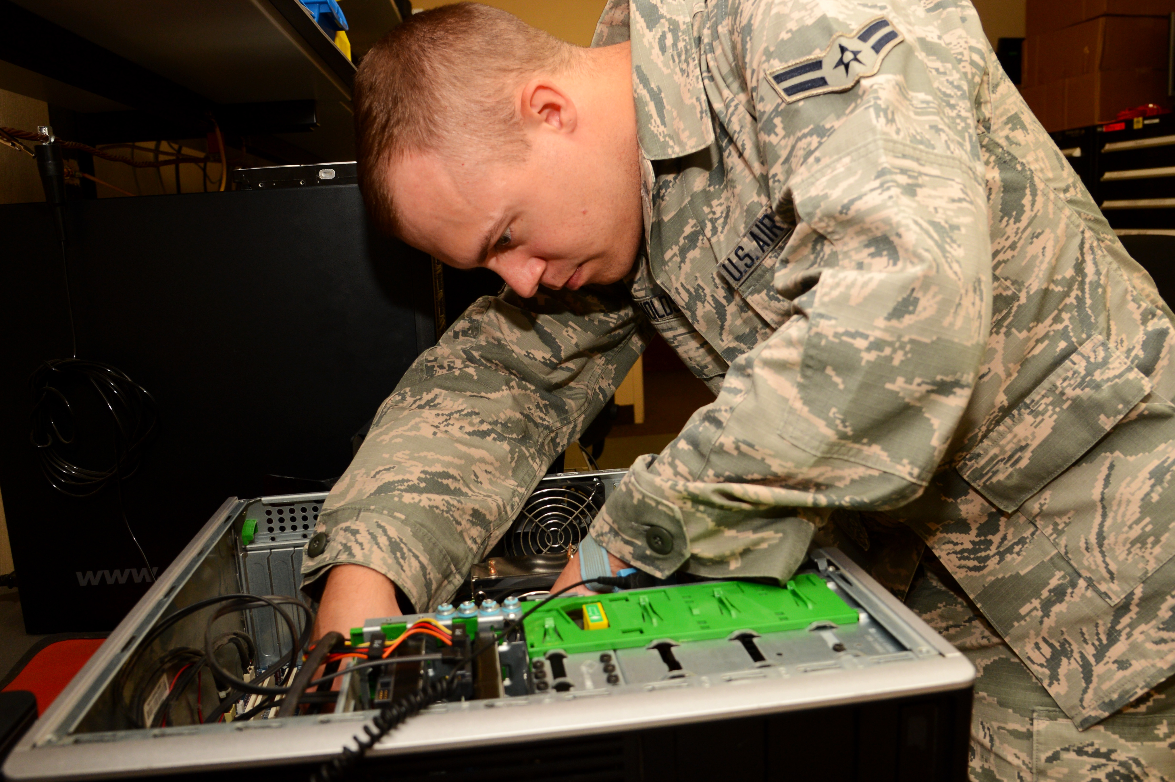Tech savvy Airman repairs computer