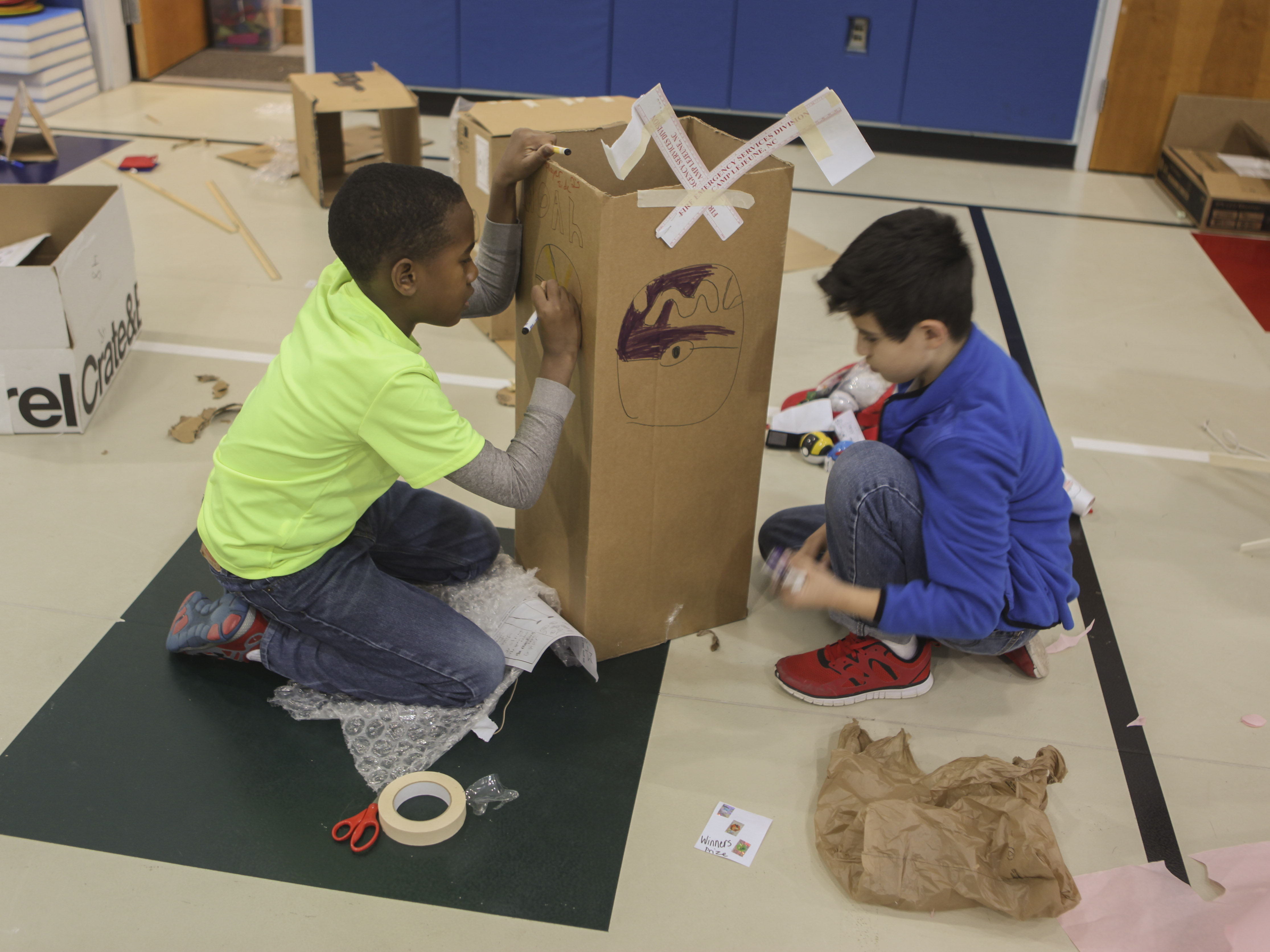 DeLalio holds Cardboard Box Challenge