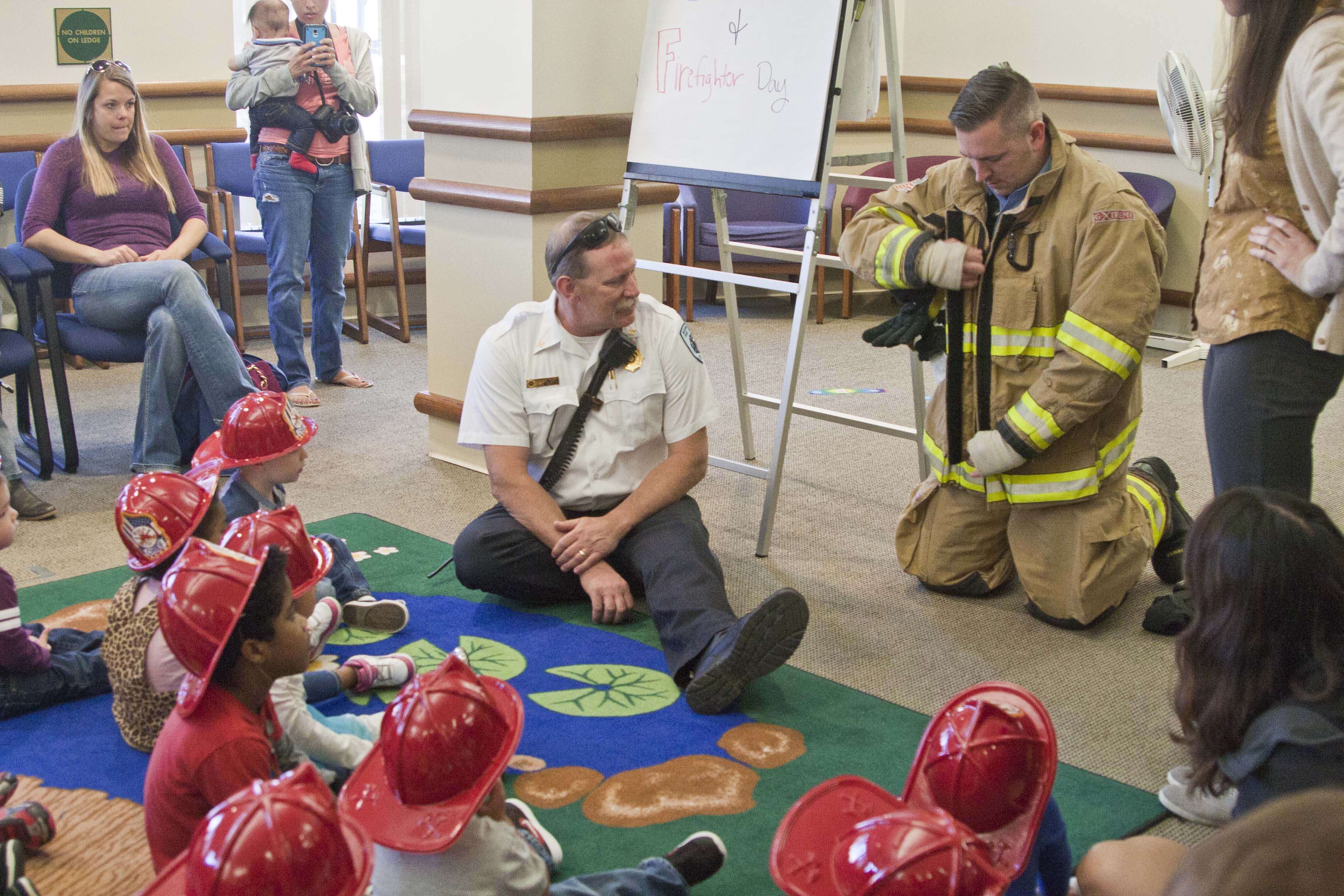 Police, firefighters take a break for story time > Marine Corps Base ...