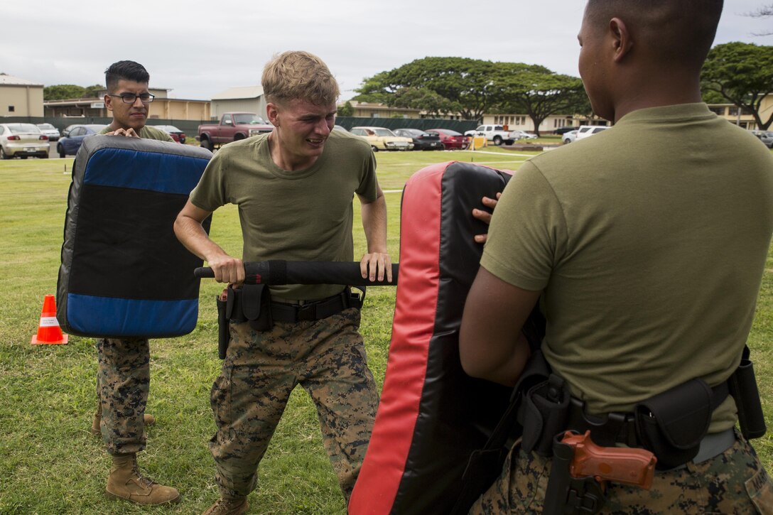 Marines shed tears, fight through pepper spray