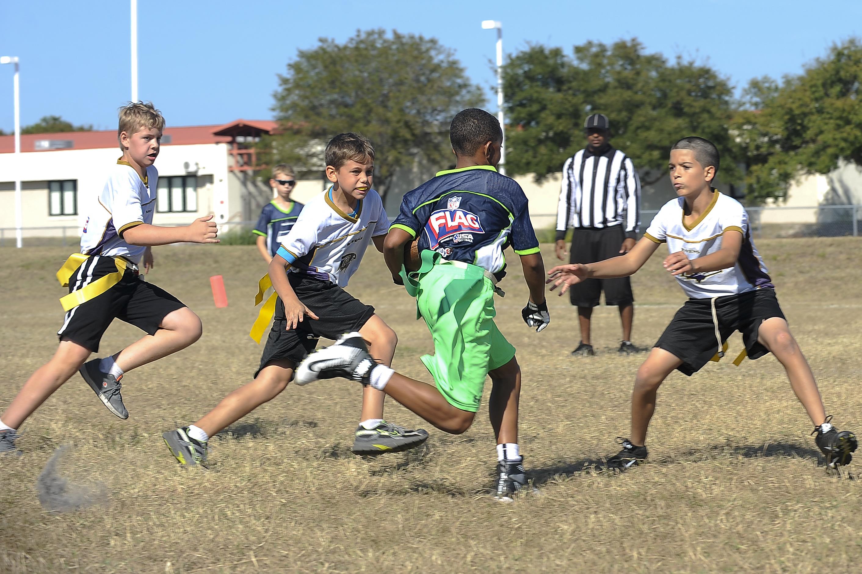 MacDill’s youth center children play flag football
