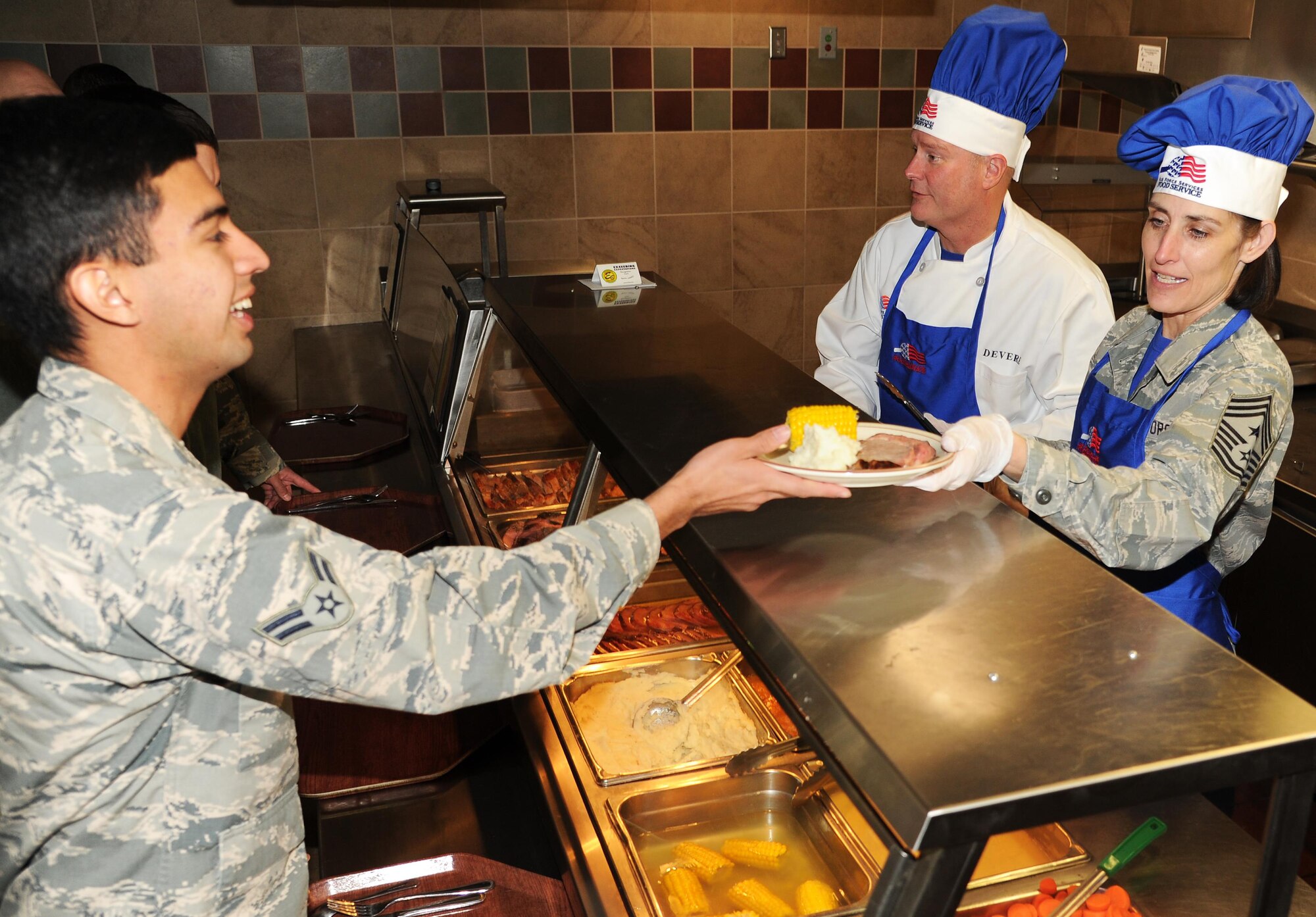 Senior leaders serve up holiday meal > 302nd Airlift Wing > Article Display