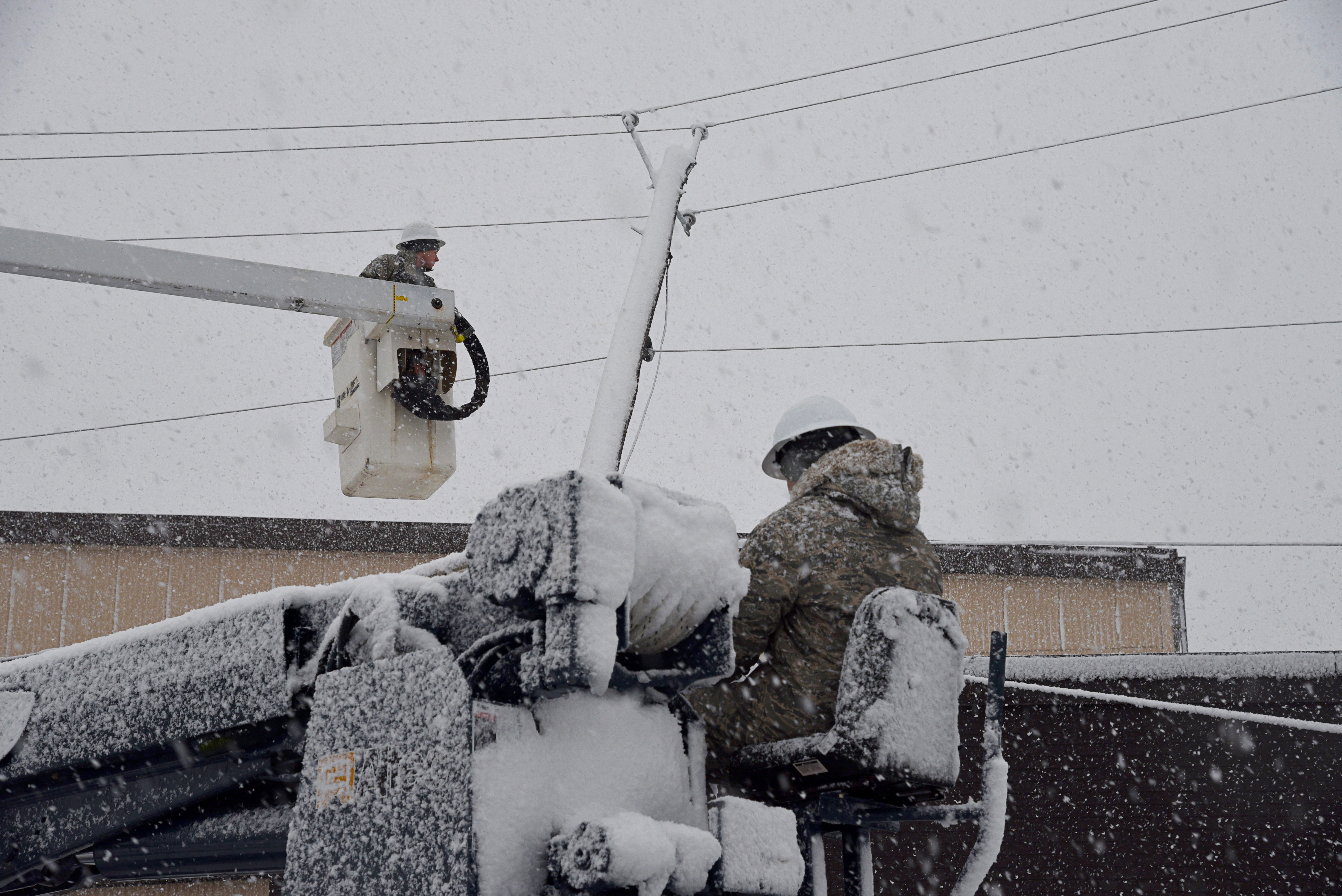 87th CES repairs downed power pole