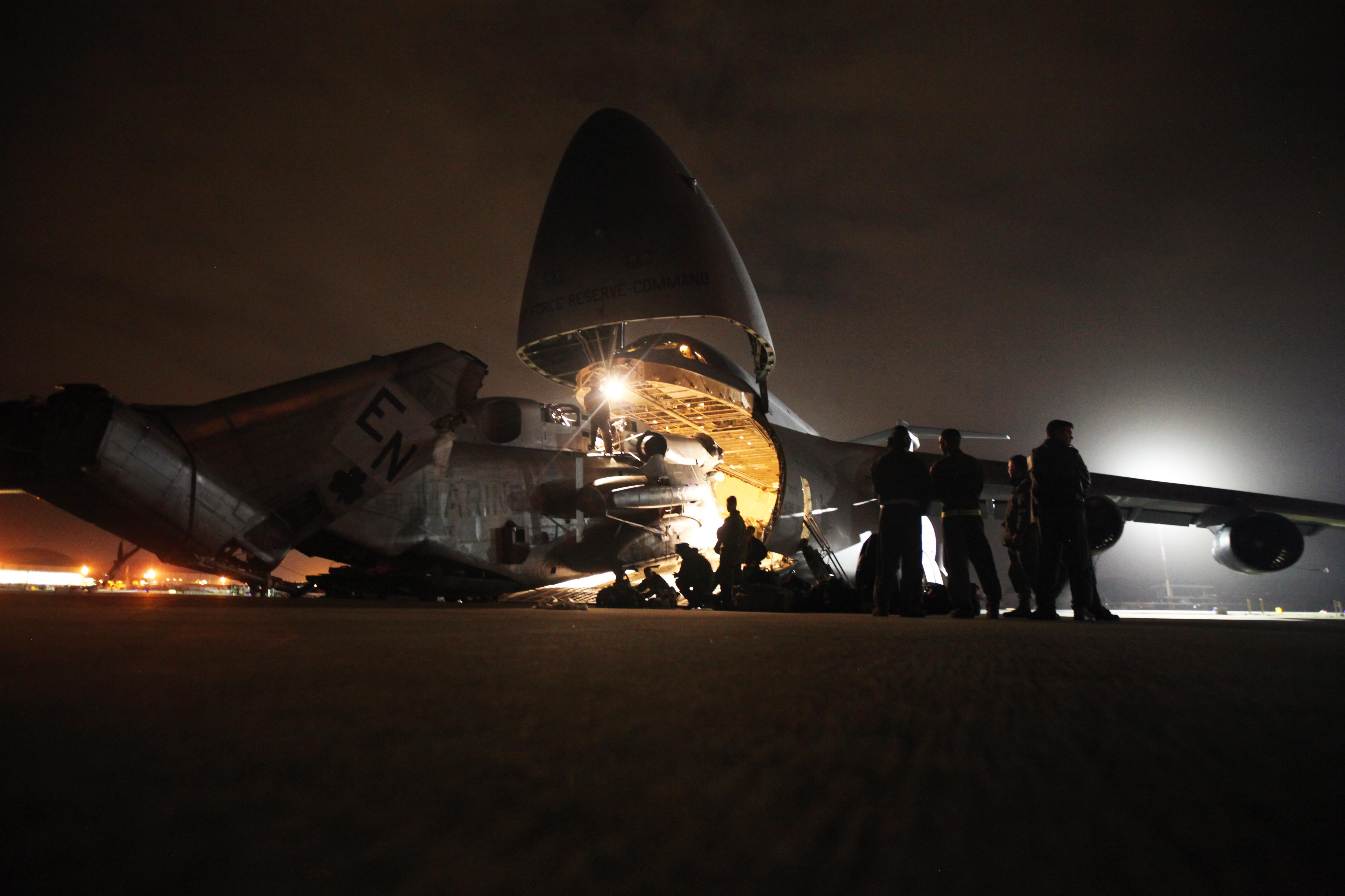Marines with HMH-464 load CH-53Es in preparation for Operation Cold ...