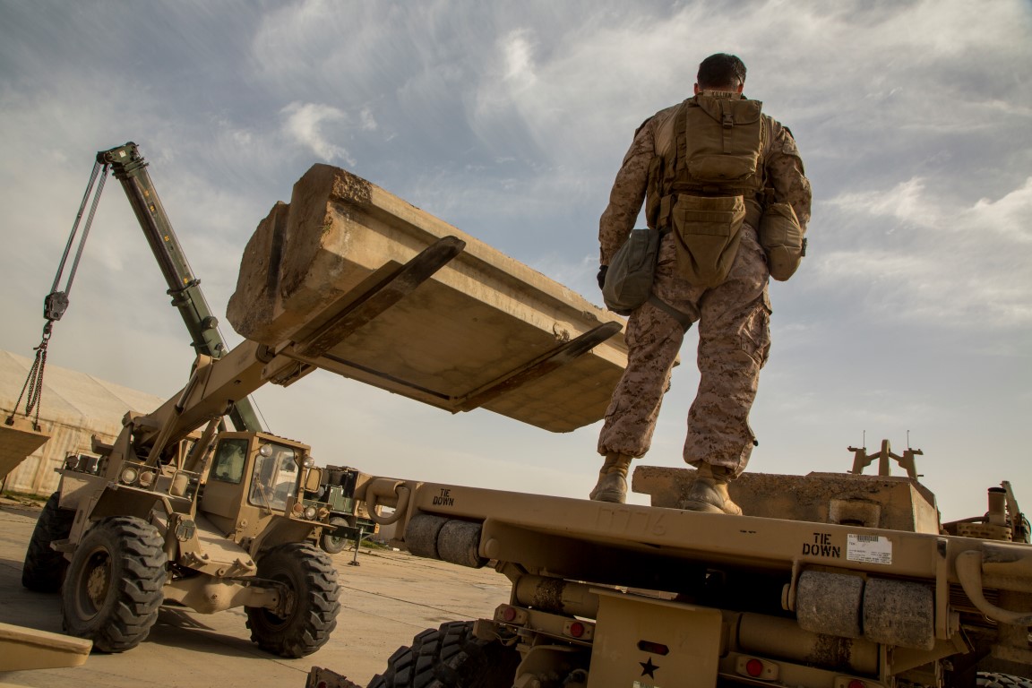 U.S. Marines, Iraqi Soldiers place barriers, reinforce protection for base
