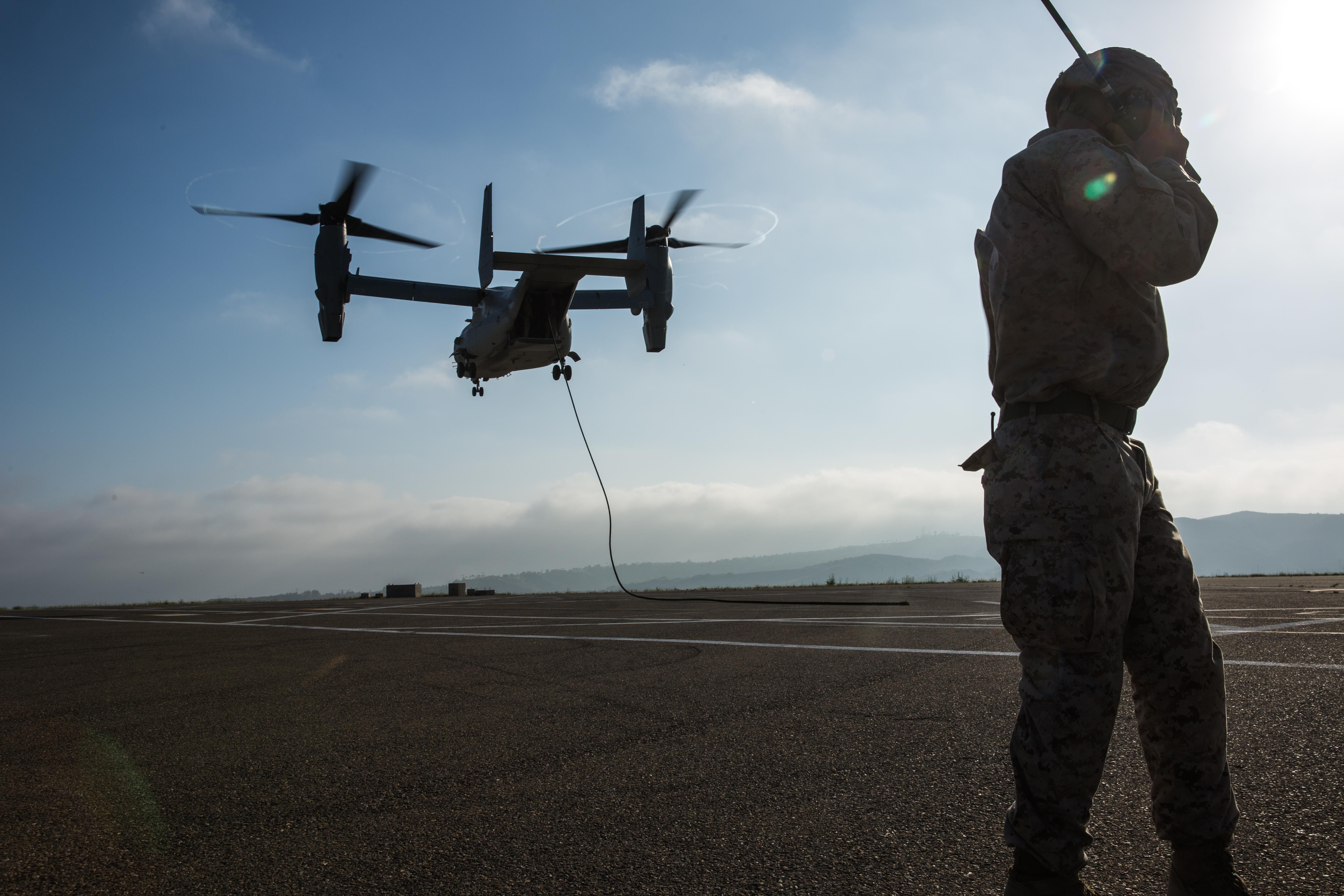 Scout Snipers, Marines with VMM-164 conduct initial fast-rope training ...