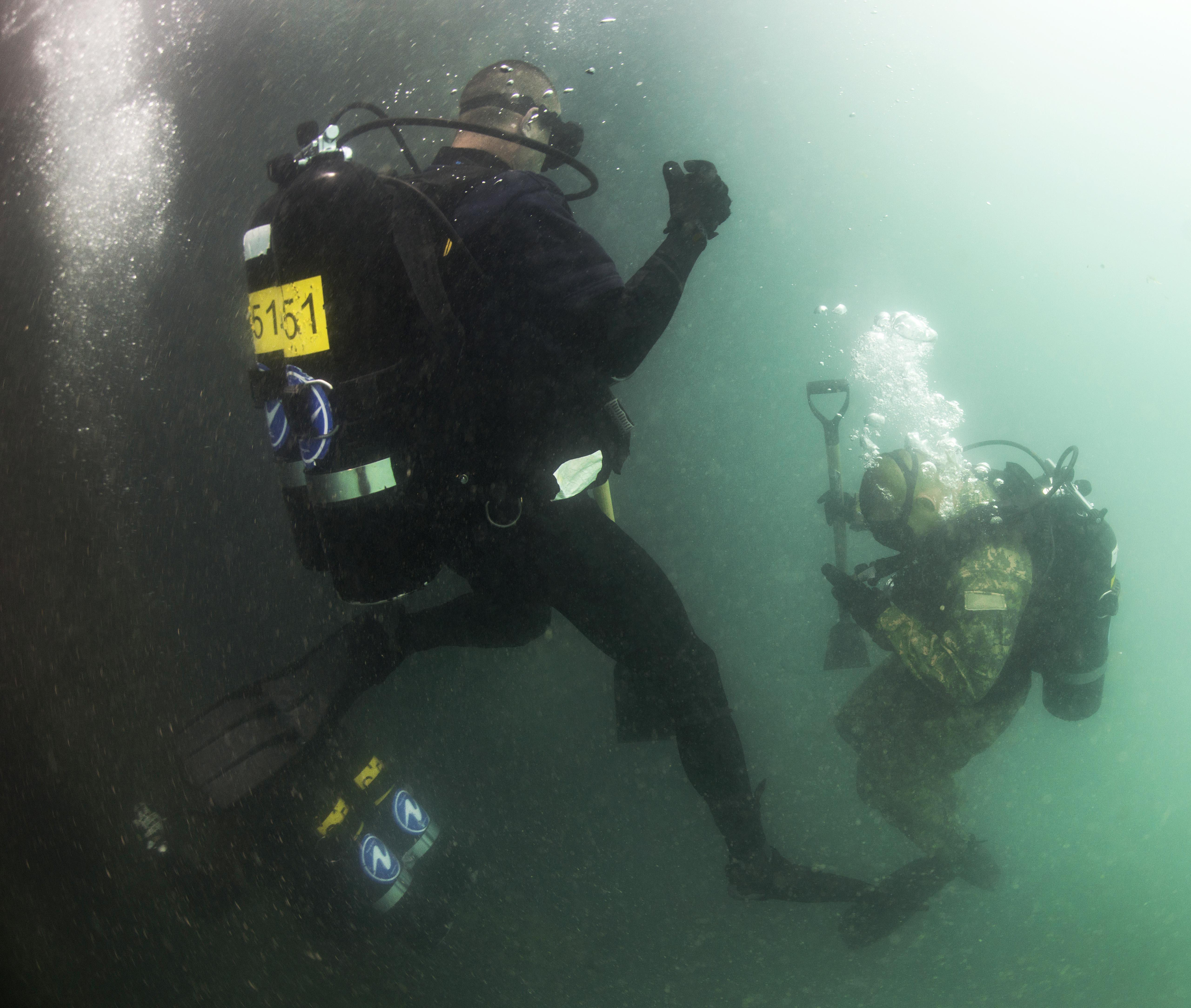 Descending Divers | U.S. Department of War
