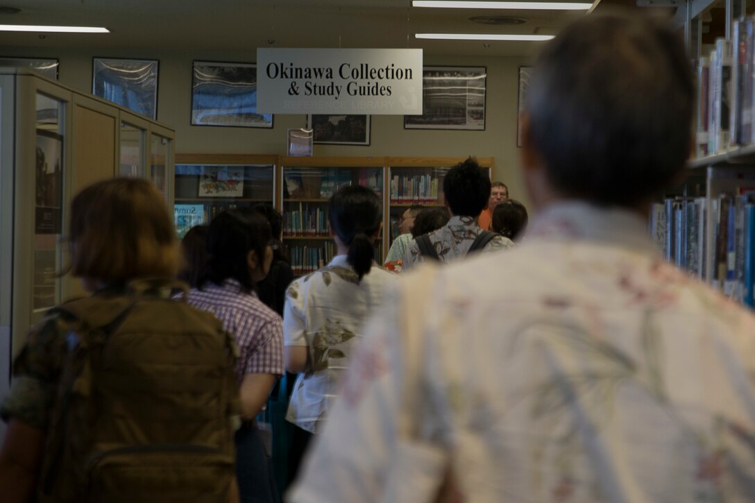 Okinawan librarians visit, exchange at Camp Foster library