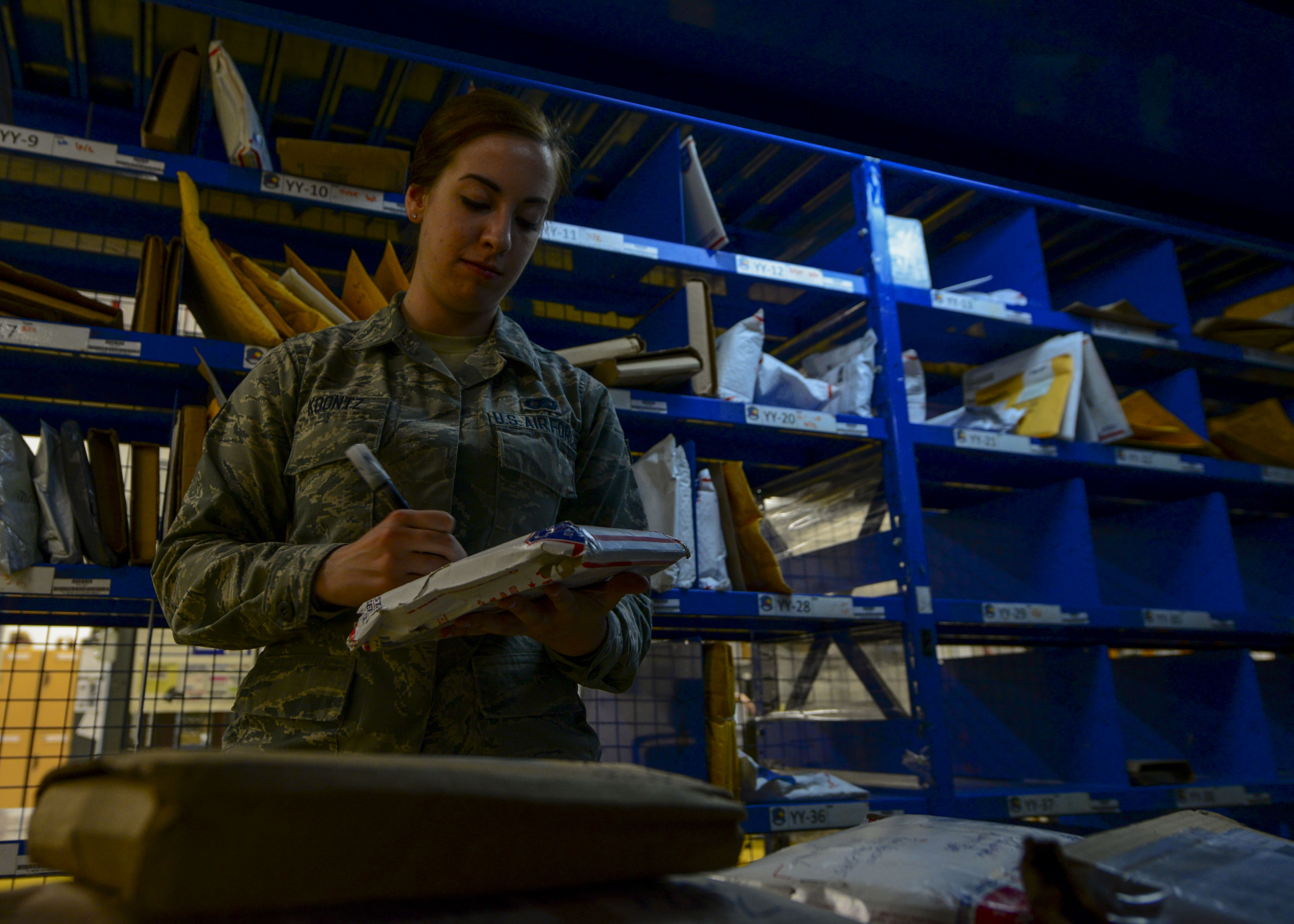 Postal workers prepare parcels for pickup > Osan Air Base > Article Display