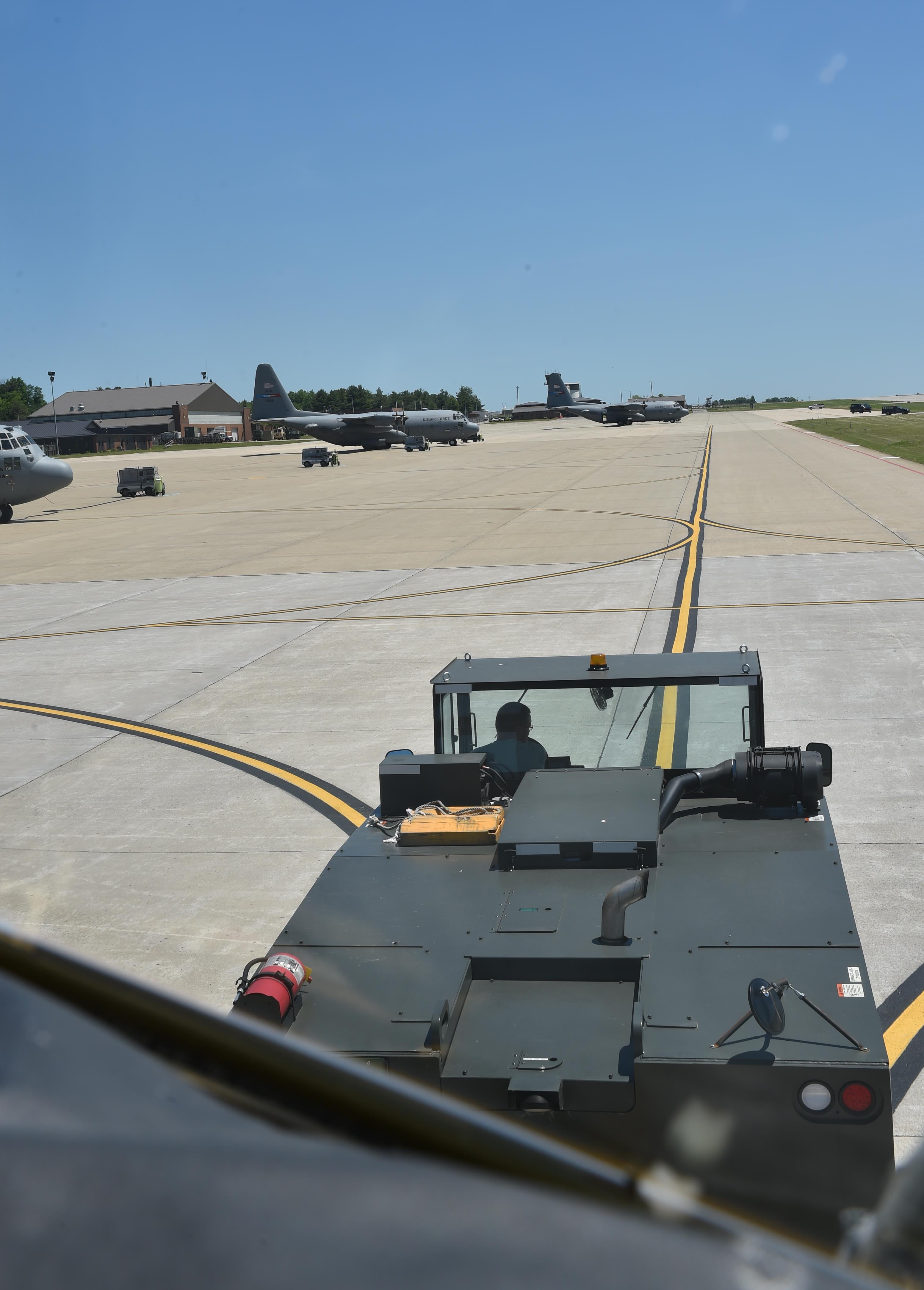 Airmen at Work: Teamwork ensures safe aircraft towing > Youngstown Air ...