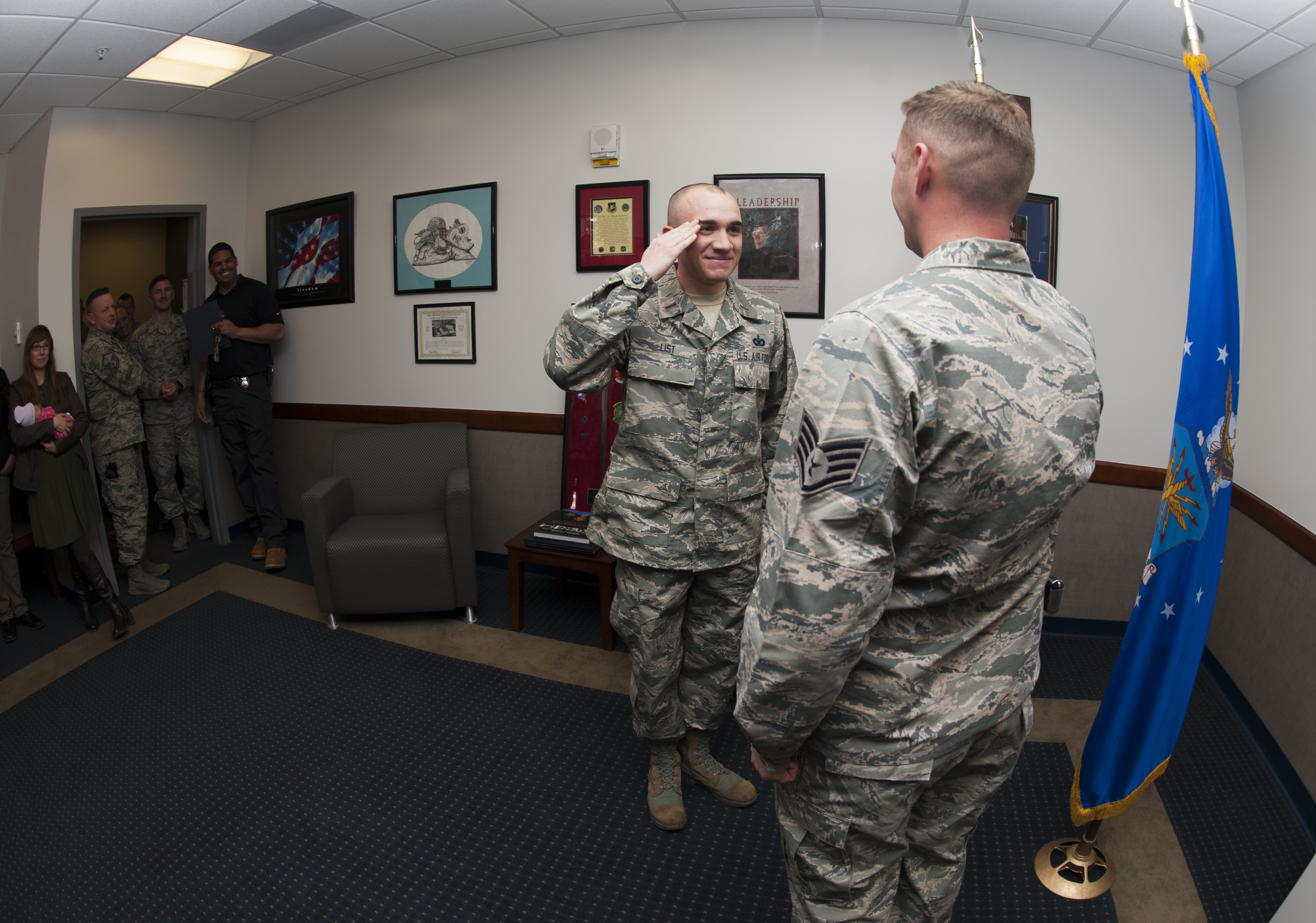 Best friend renders first salute to newly commissioned officer ...