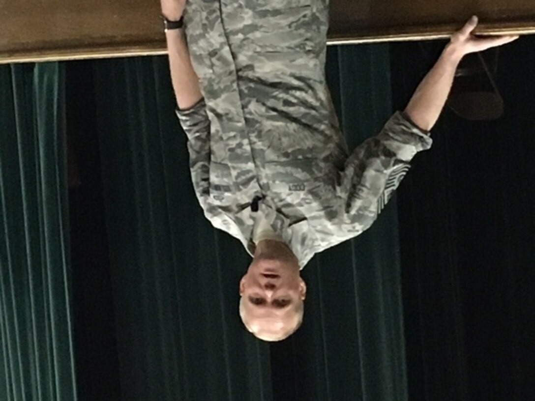 Chief Master Sergeant of the Air Force James A. Cody talks with Airmen