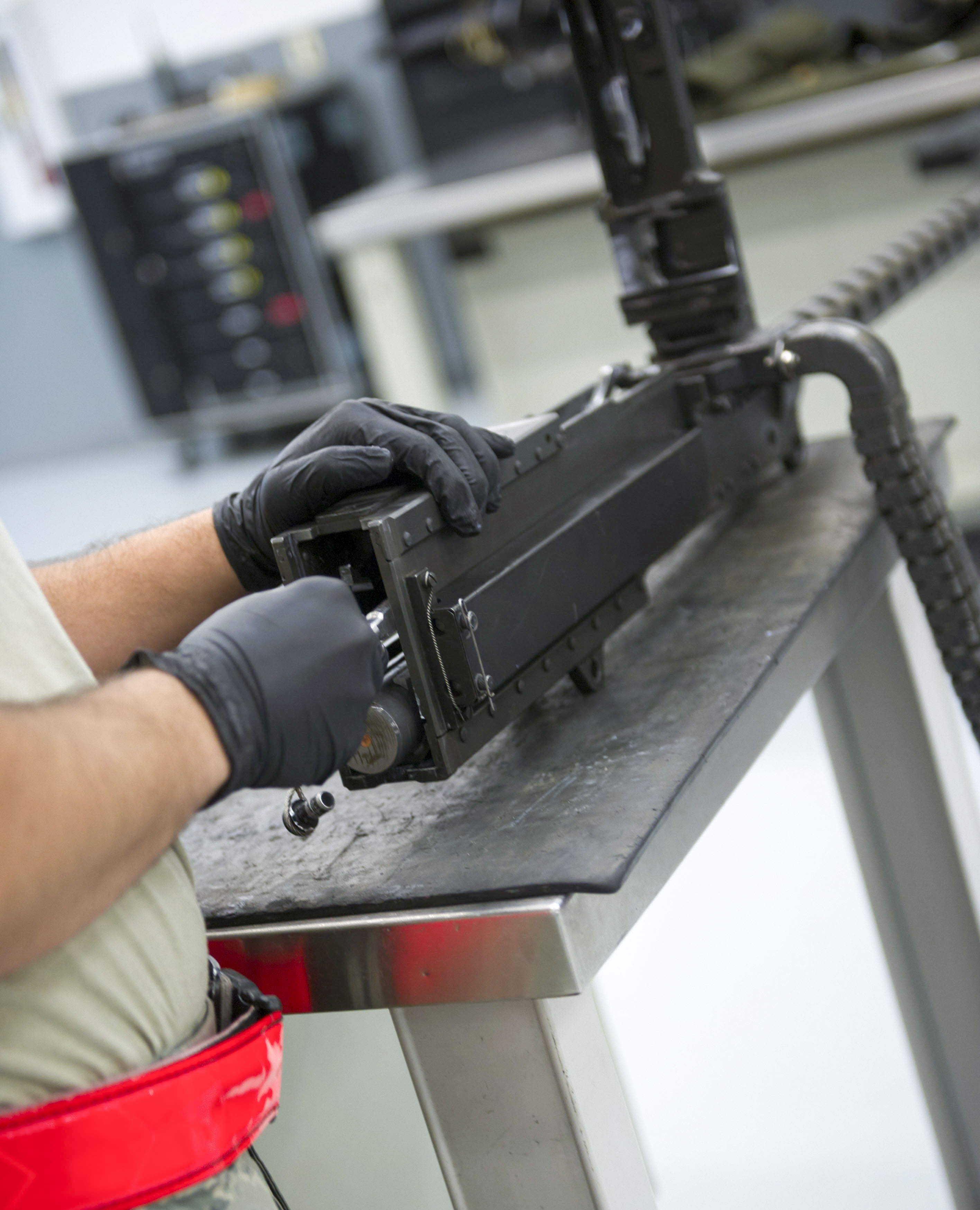 Weapons load crew Airmen perform inspections