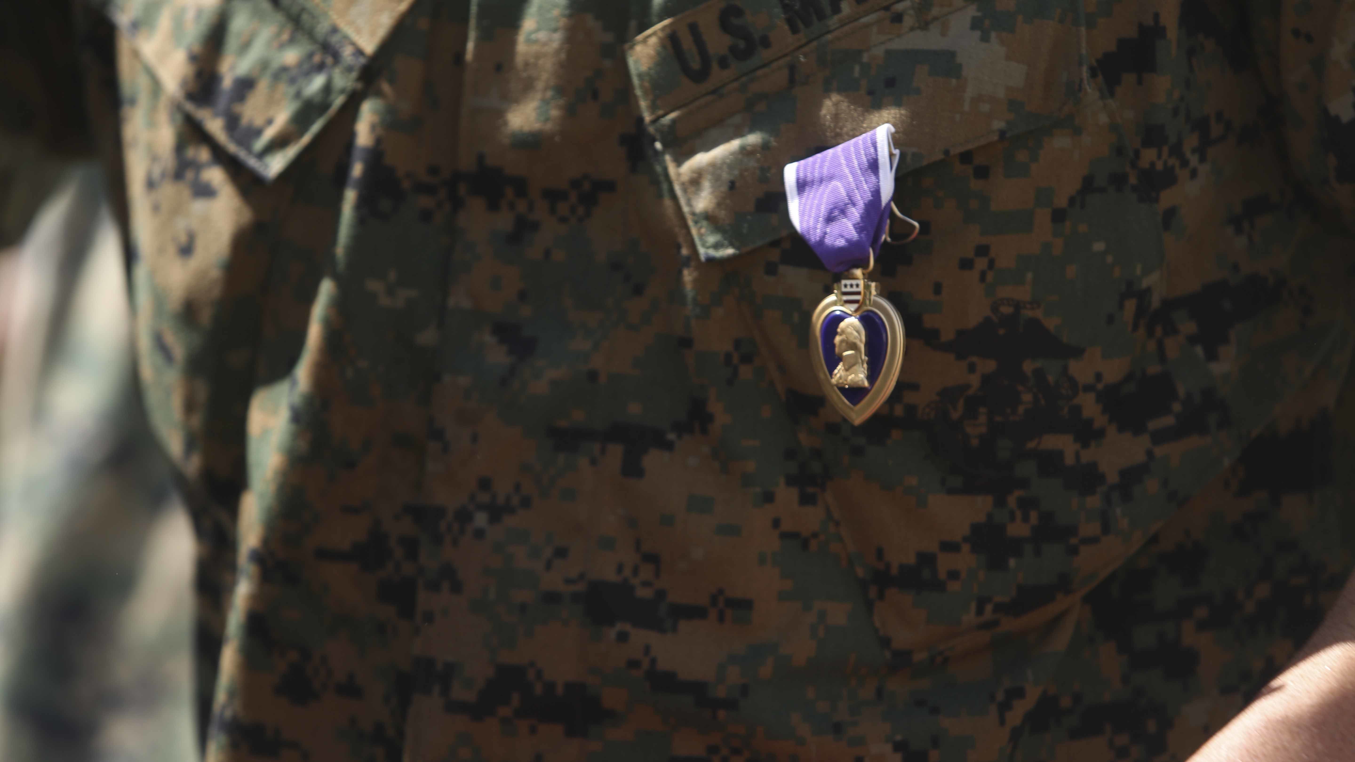 Marine Recieves Purple Heart in Front of Building Dedicated to Marine ...