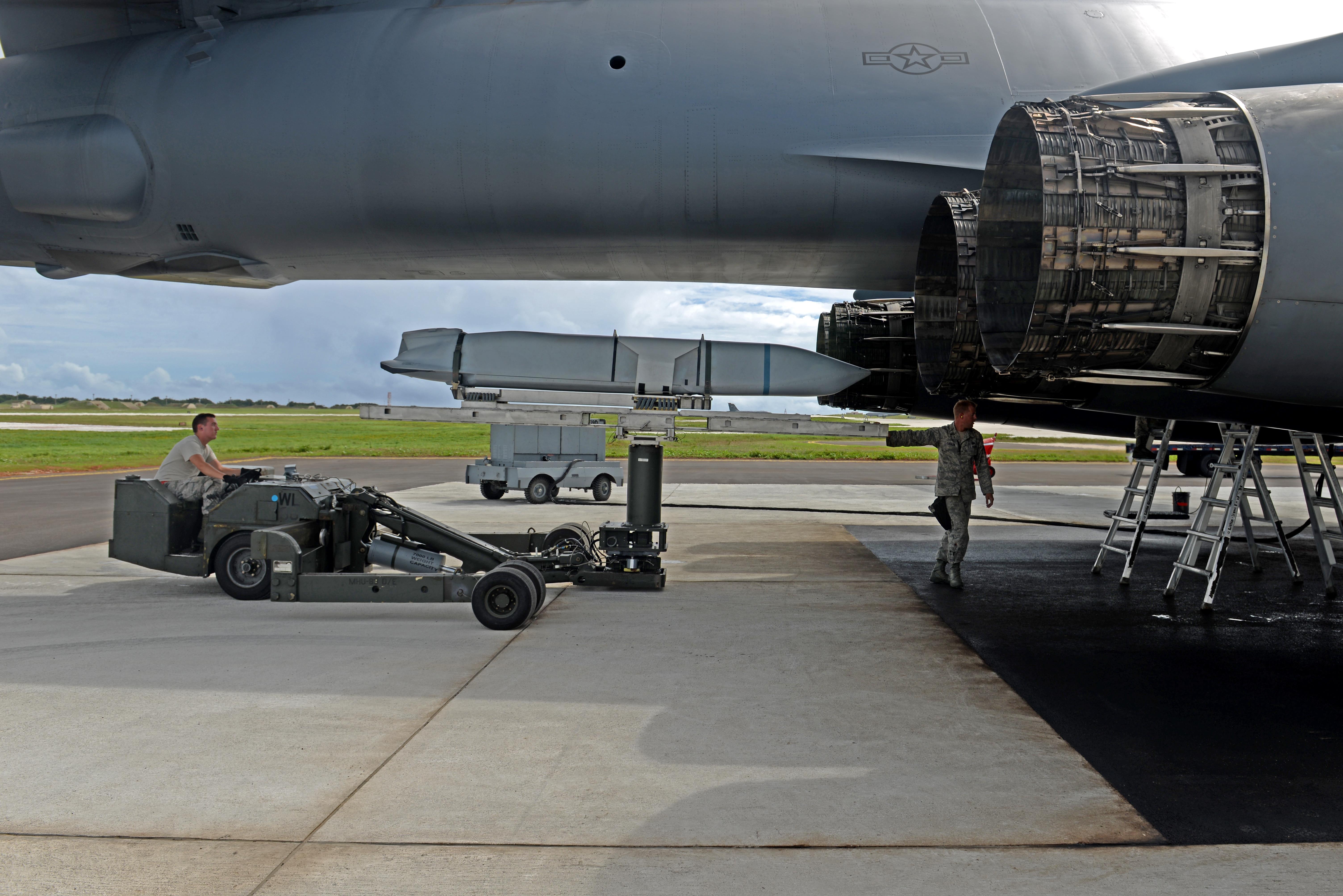 AGM-158 Joint Air-to-Surface Standoff Missile being loaded into the ...