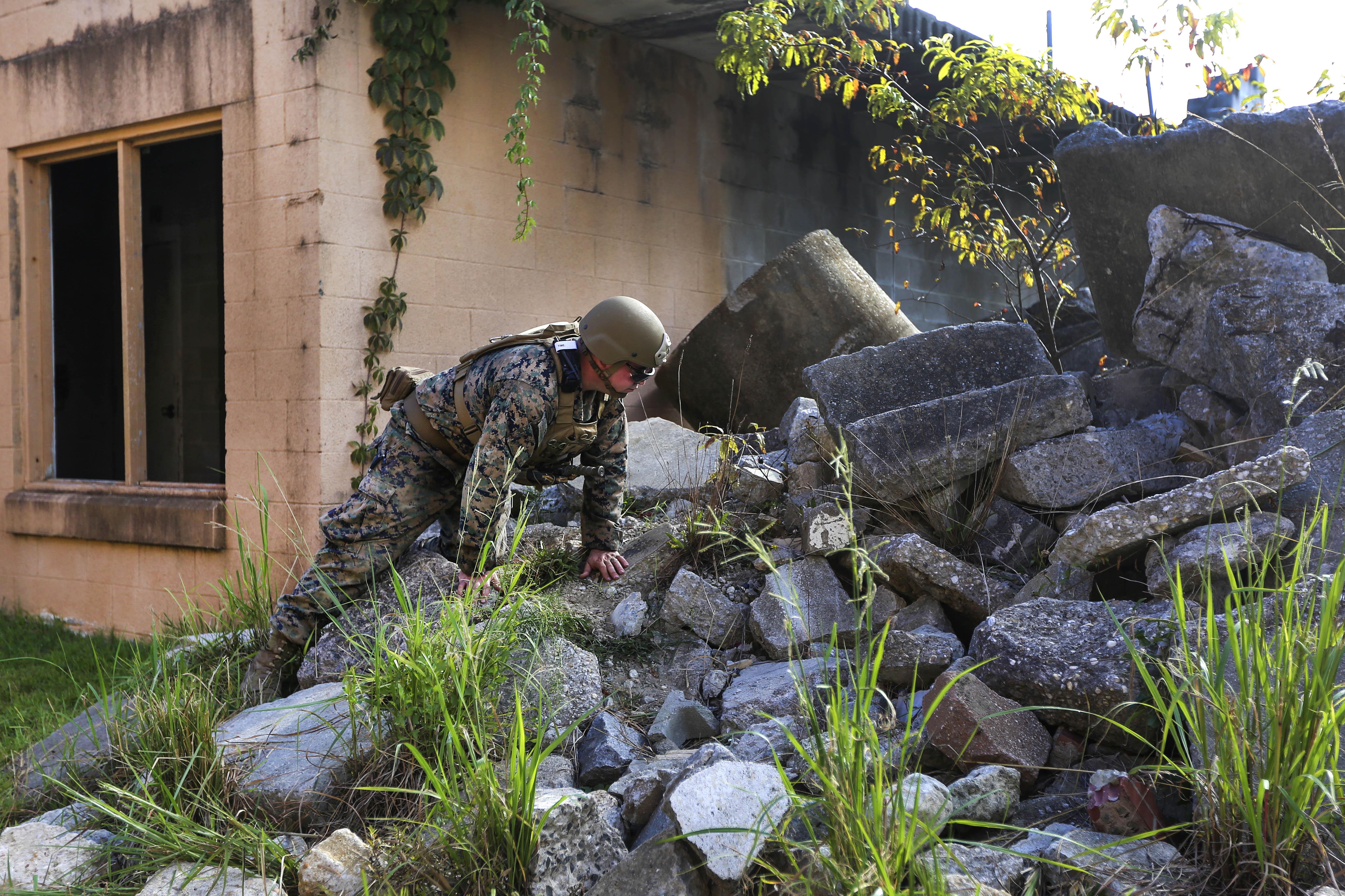 Searching Rubble | U.S. Department of War