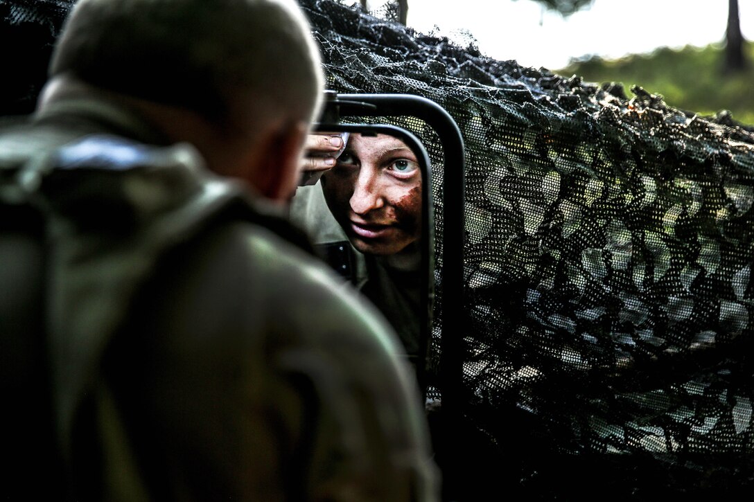 Applying Camouflage | U.S. Department of War