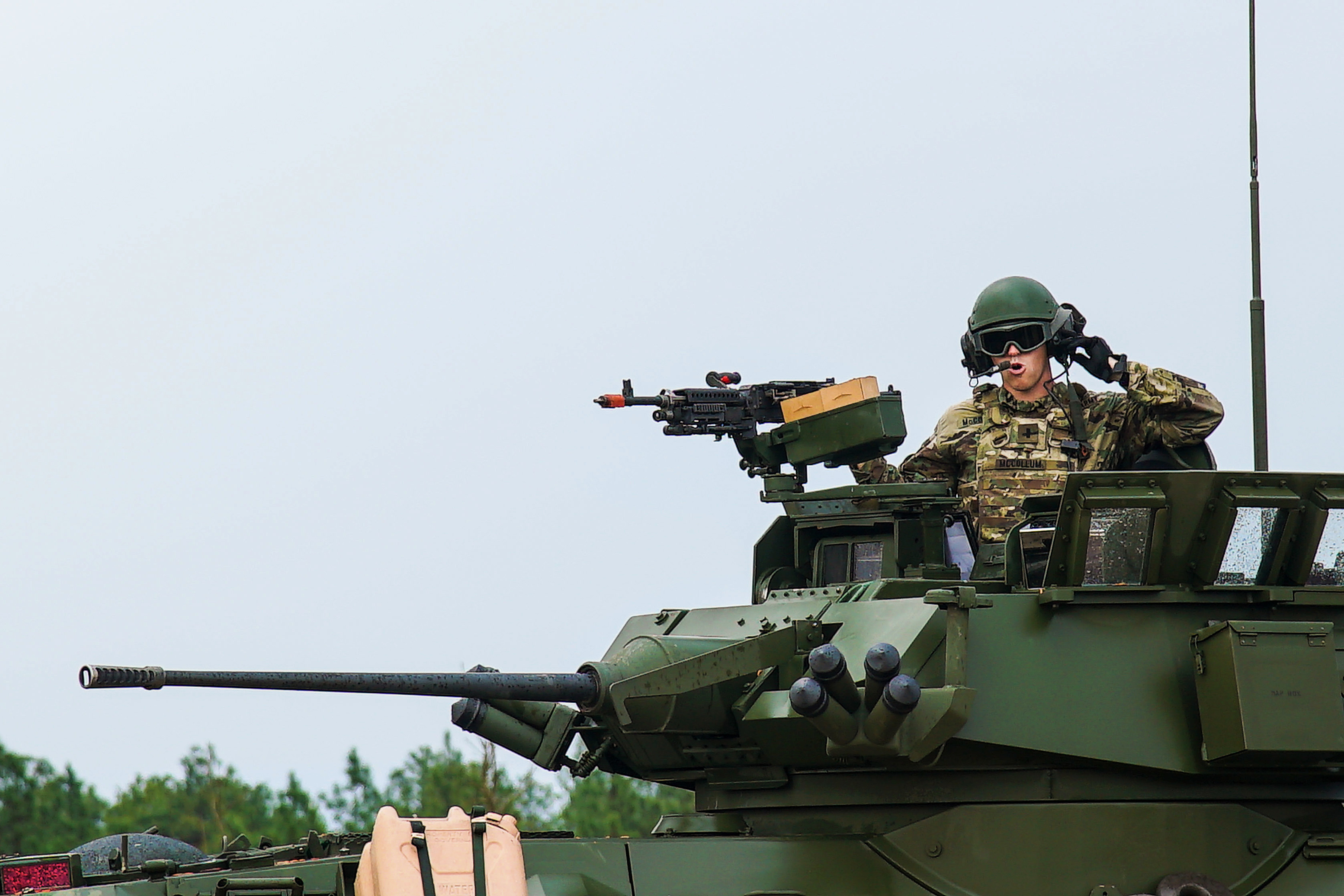 1st Lt. William McCollum provides instructions to other LAV-25 crews ...