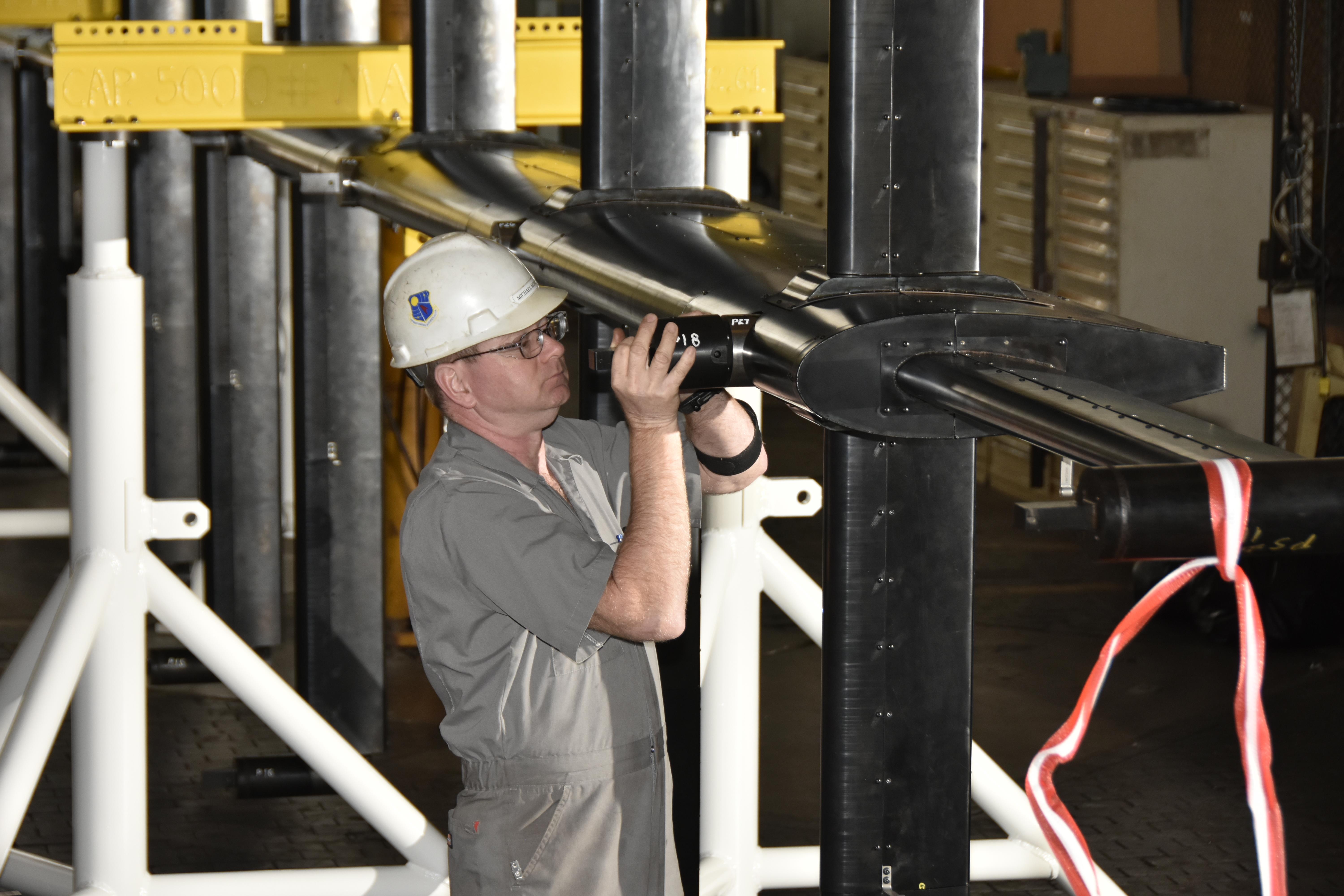 Rake fabricated at AEDC Model and Machine Shop to be used for flow ...