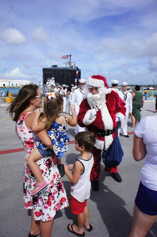 Santa Delivers Candy Canes During Asheville Arrival to Guam