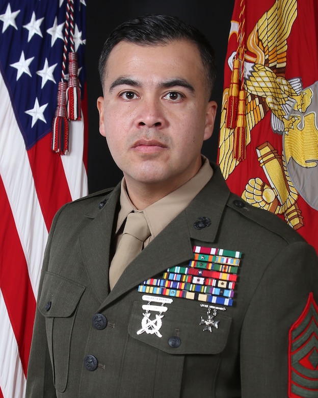 First Sergeant Roger J. Baez > Training Command > Biography