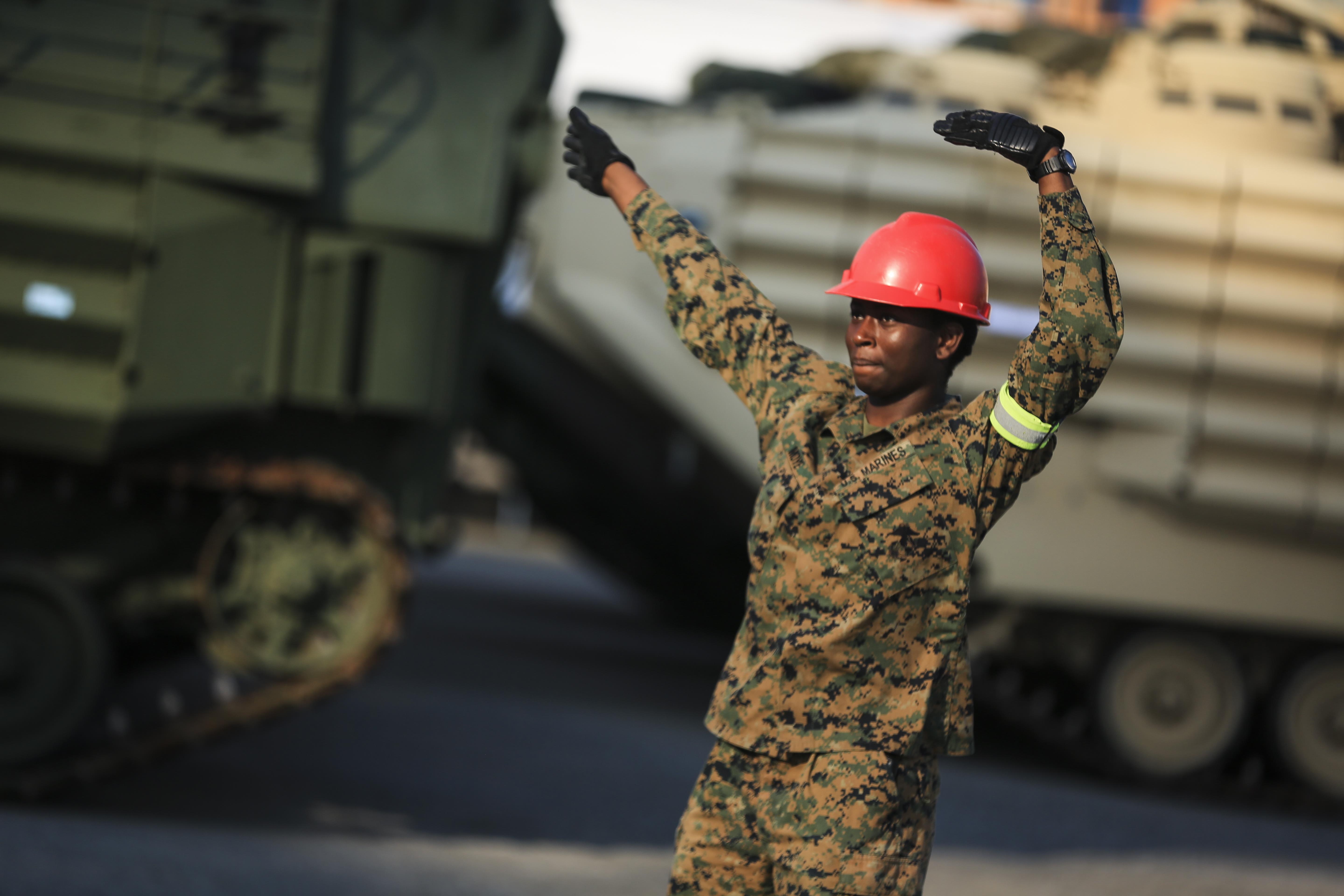 Offloading Begins on the USNS Gunnery Sgt. Fred W. Stockham During ...