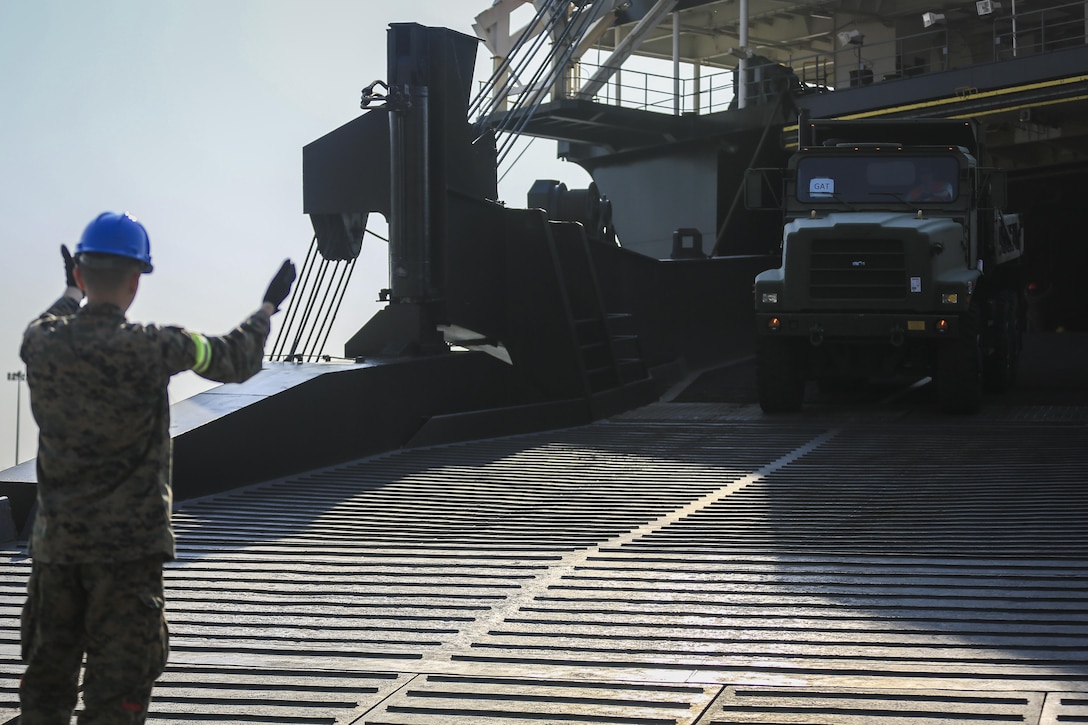 Offloading Begins on the USNS Gunnery Sgt. Fred W. Stockham During ...