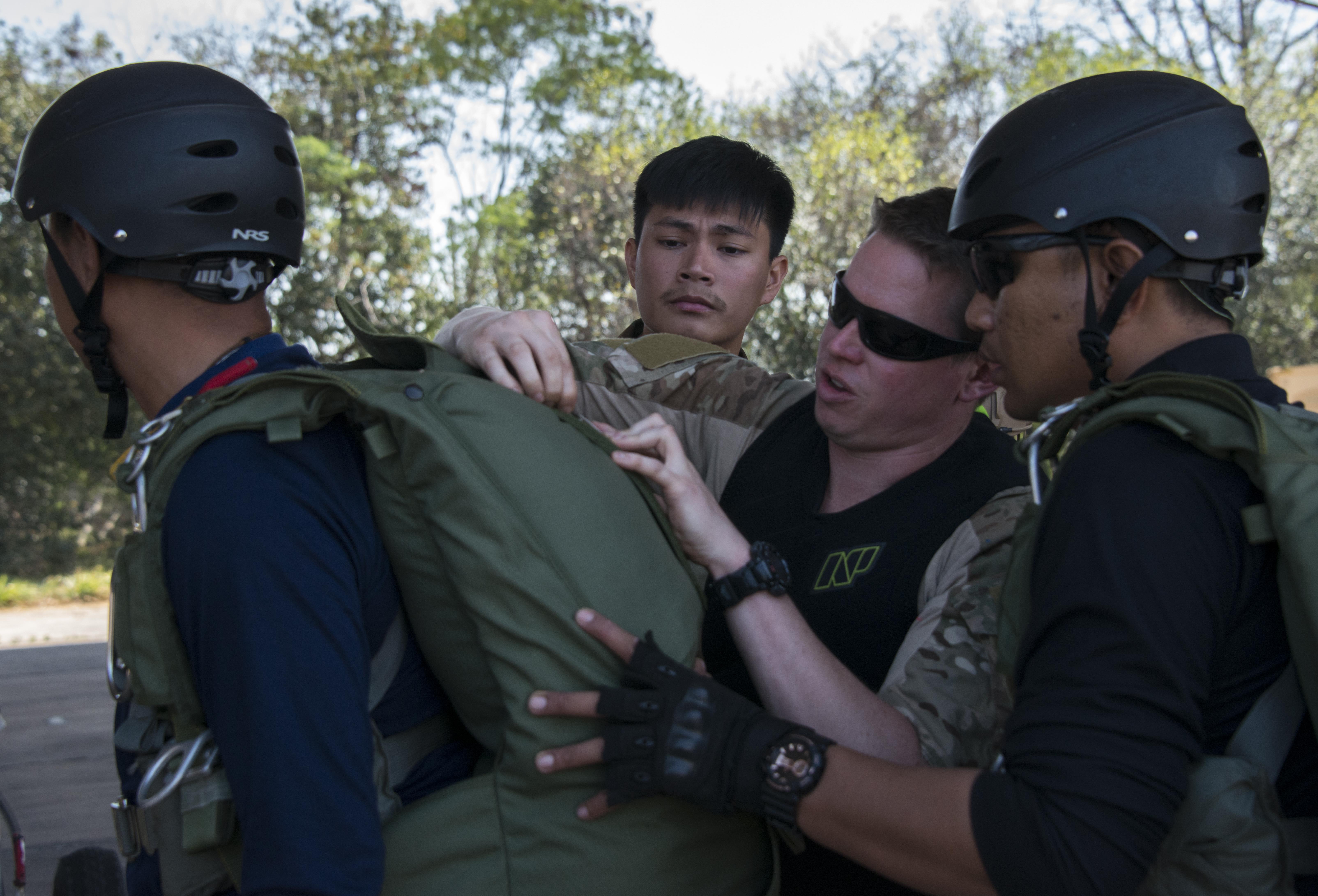 320th STS and RTAF PJs exercise water recovery operations > 353d ...