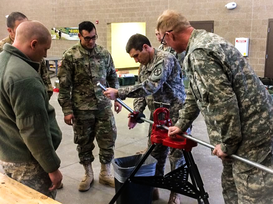 Staff Sgt. Douglas K. Browning instructs soldiers on how to evaluate ...