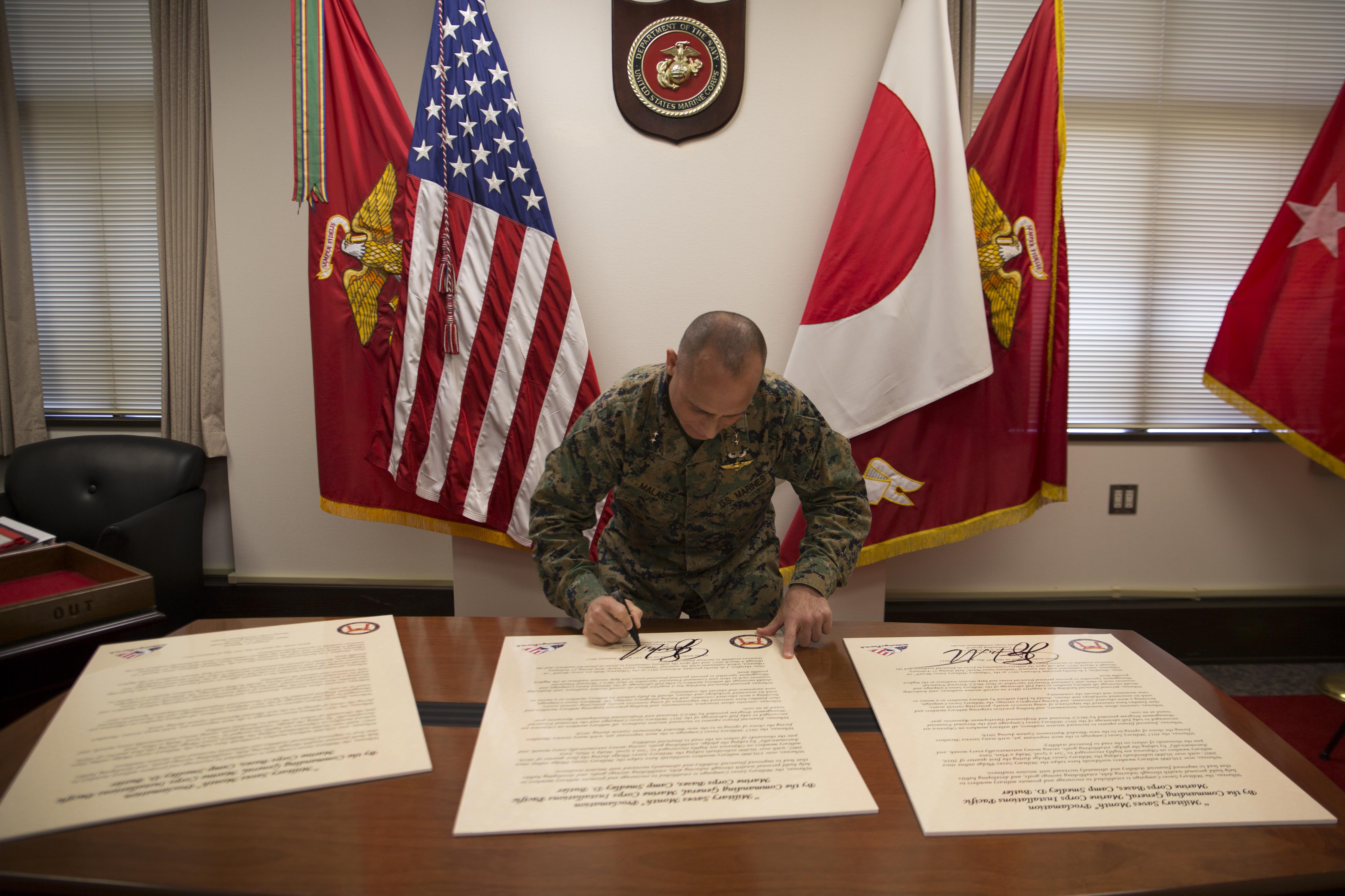 Maj. Gen. Malavet signs Military Saves Proclamation aboard Camp Foster
