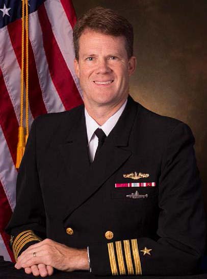 Captain Gregory D. Burton, USN