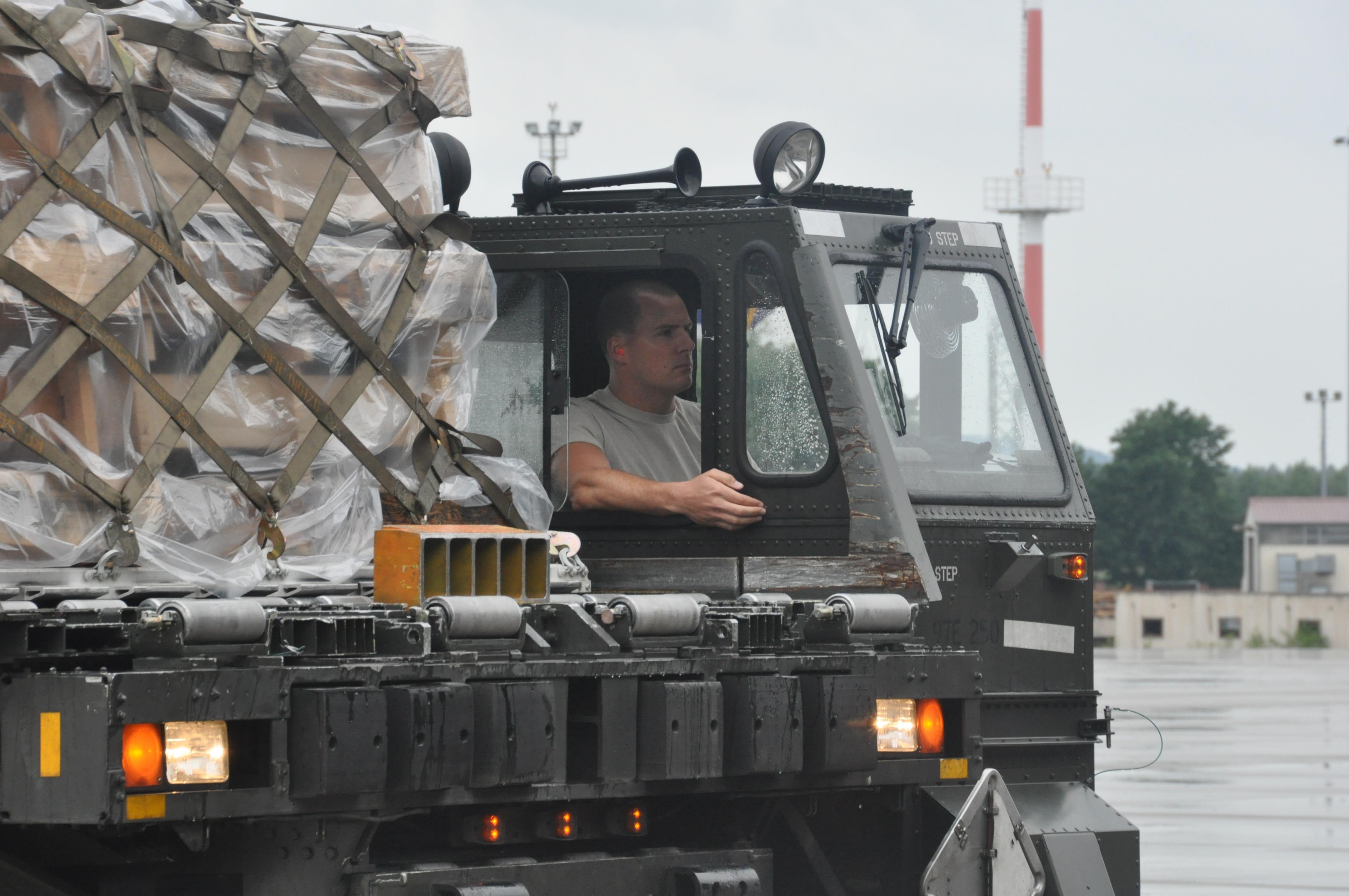 Moving cargo on a busy ramp? Aerial Porters from the 81st make it look ...