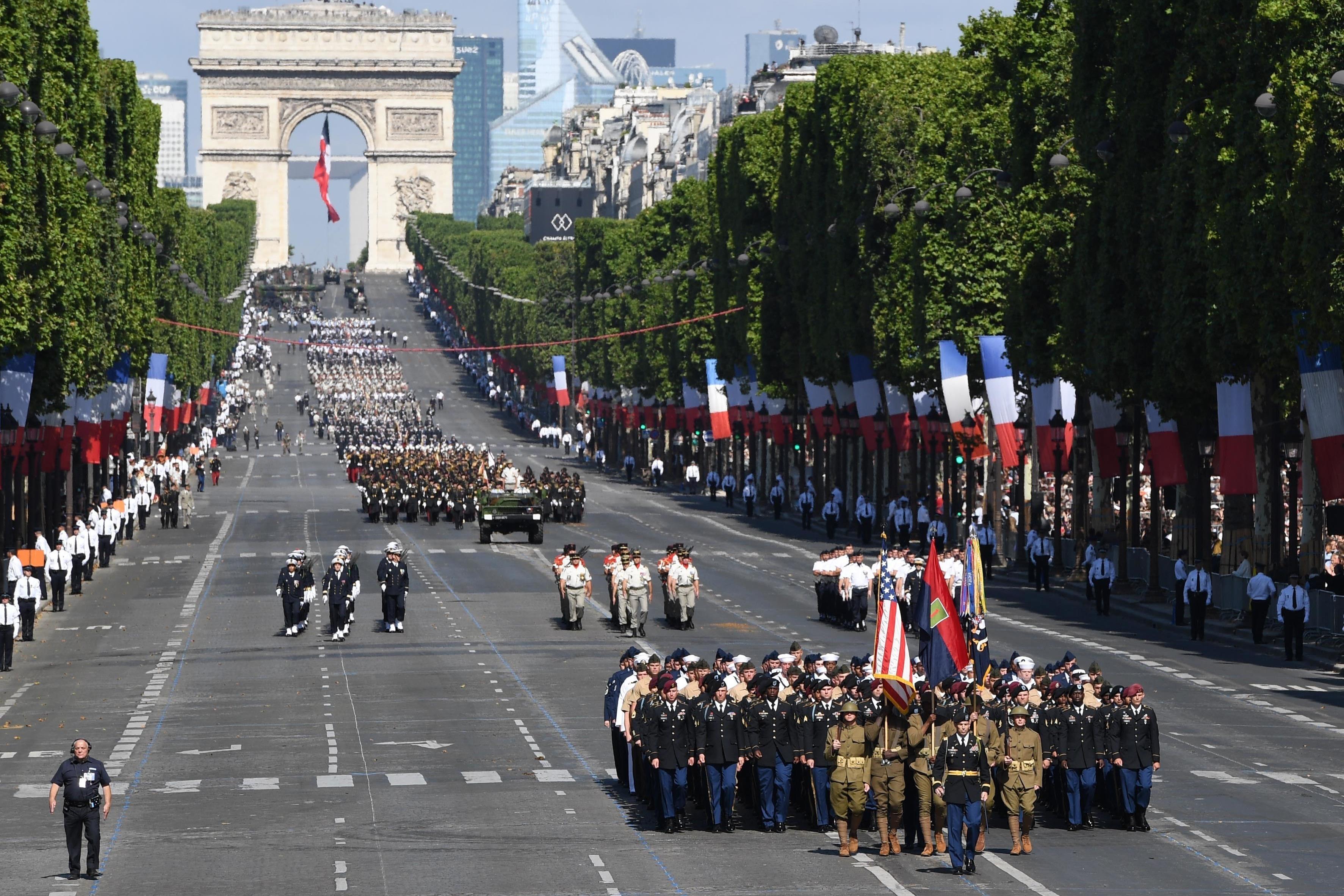 American soldiers, sailors, airmen and Marines lead the annual Bastille ...